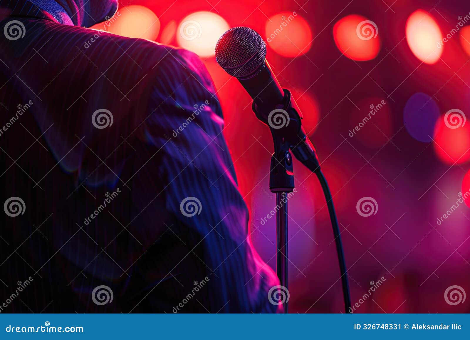 Businessman Giving Speech on the Microphone on Stage in Front of the ...