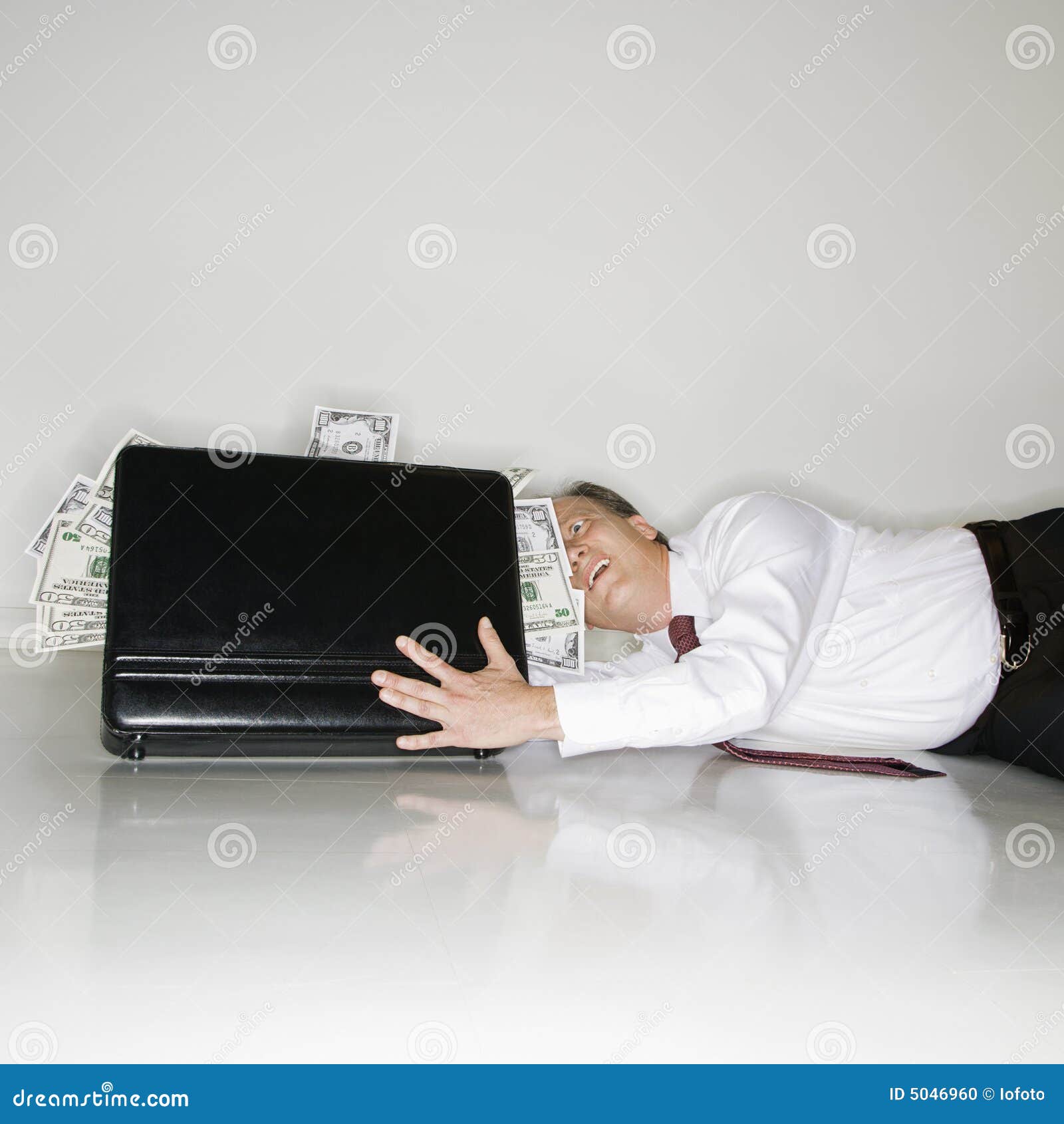 Businessman grabbing money stock photo. Image of capital - 5046960