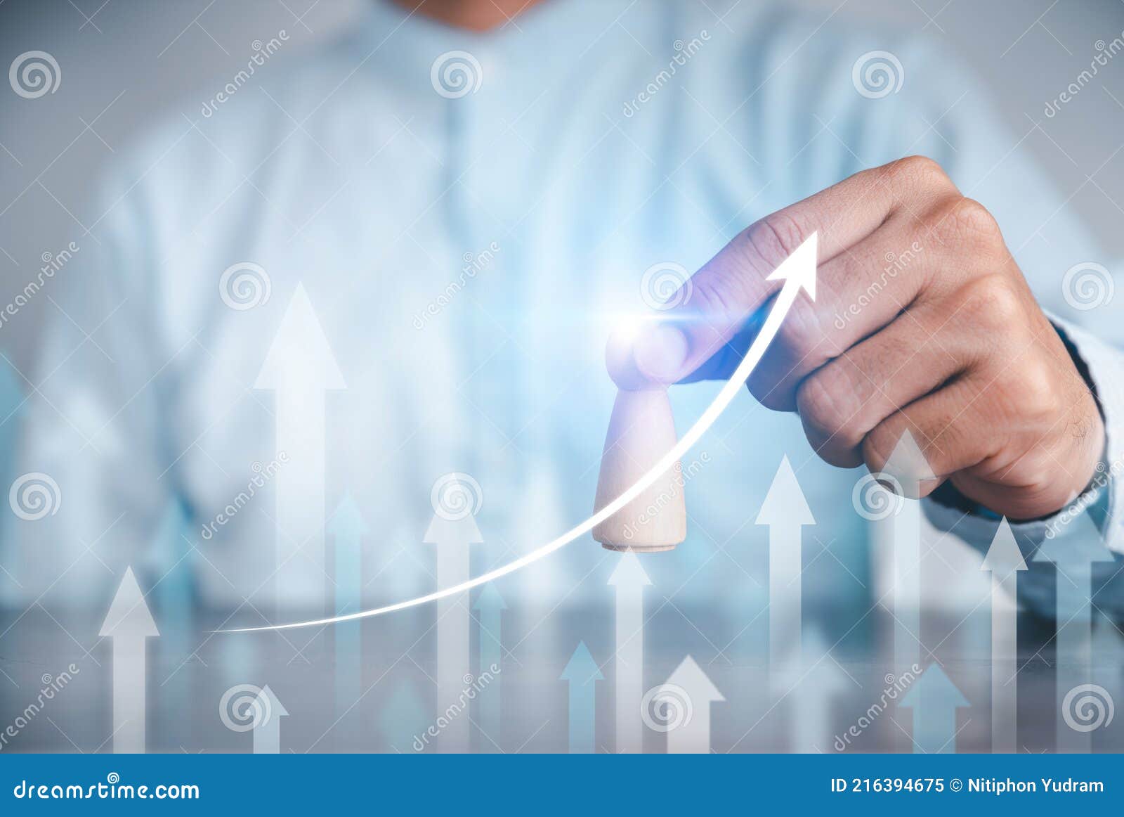 Businessman Graphs How the Arrow Grows Up on a High-tech Blue ...