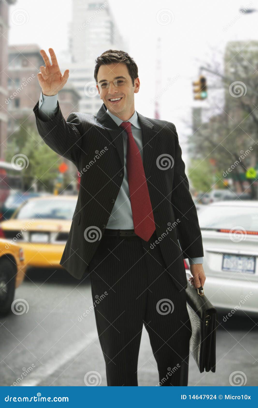 Businessman Hailing a Taxi stock photo. Image of adult - 14647924