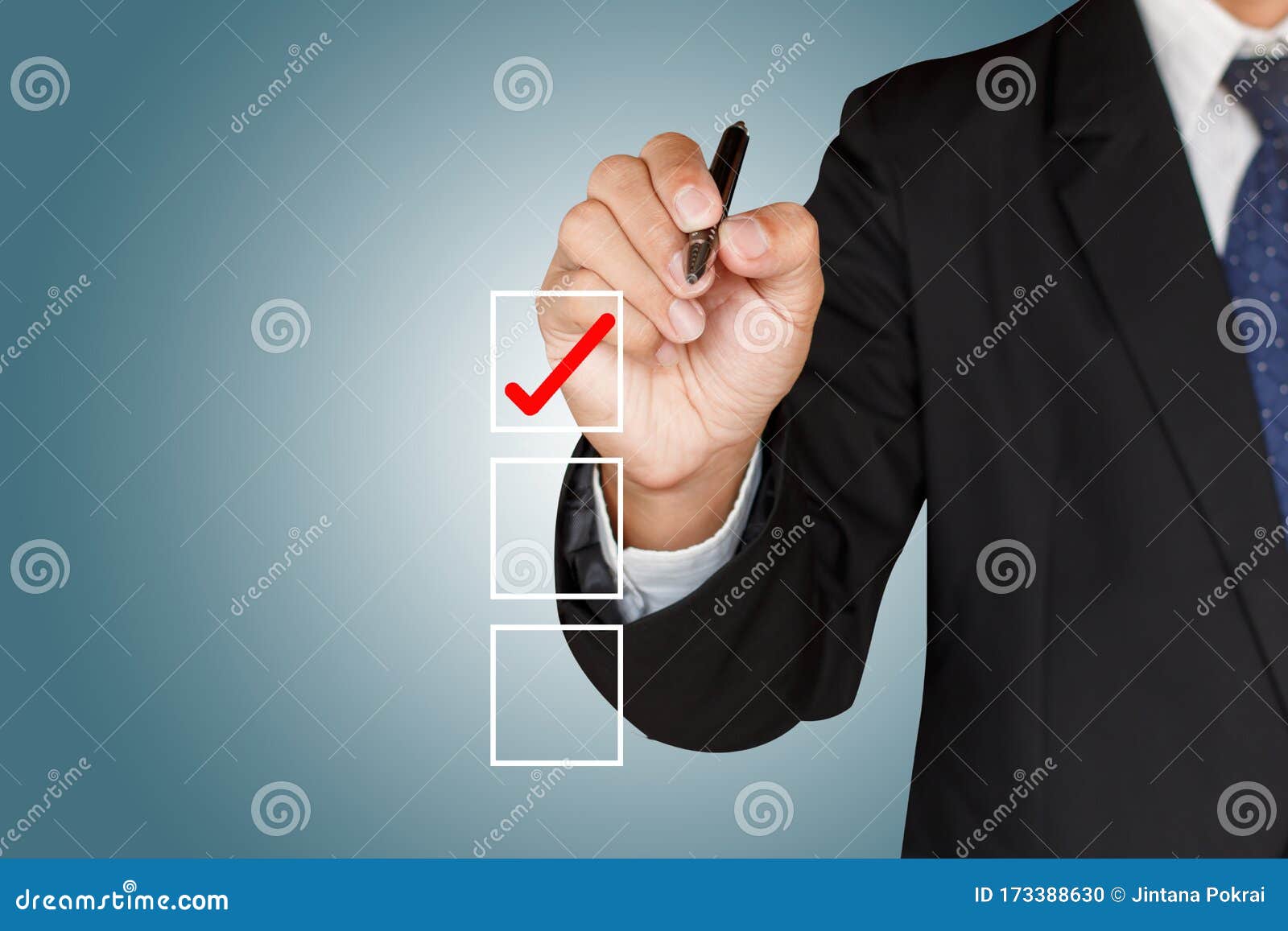 Businessman Hand Checking the Checklist Boxes on Green Background Stock ...