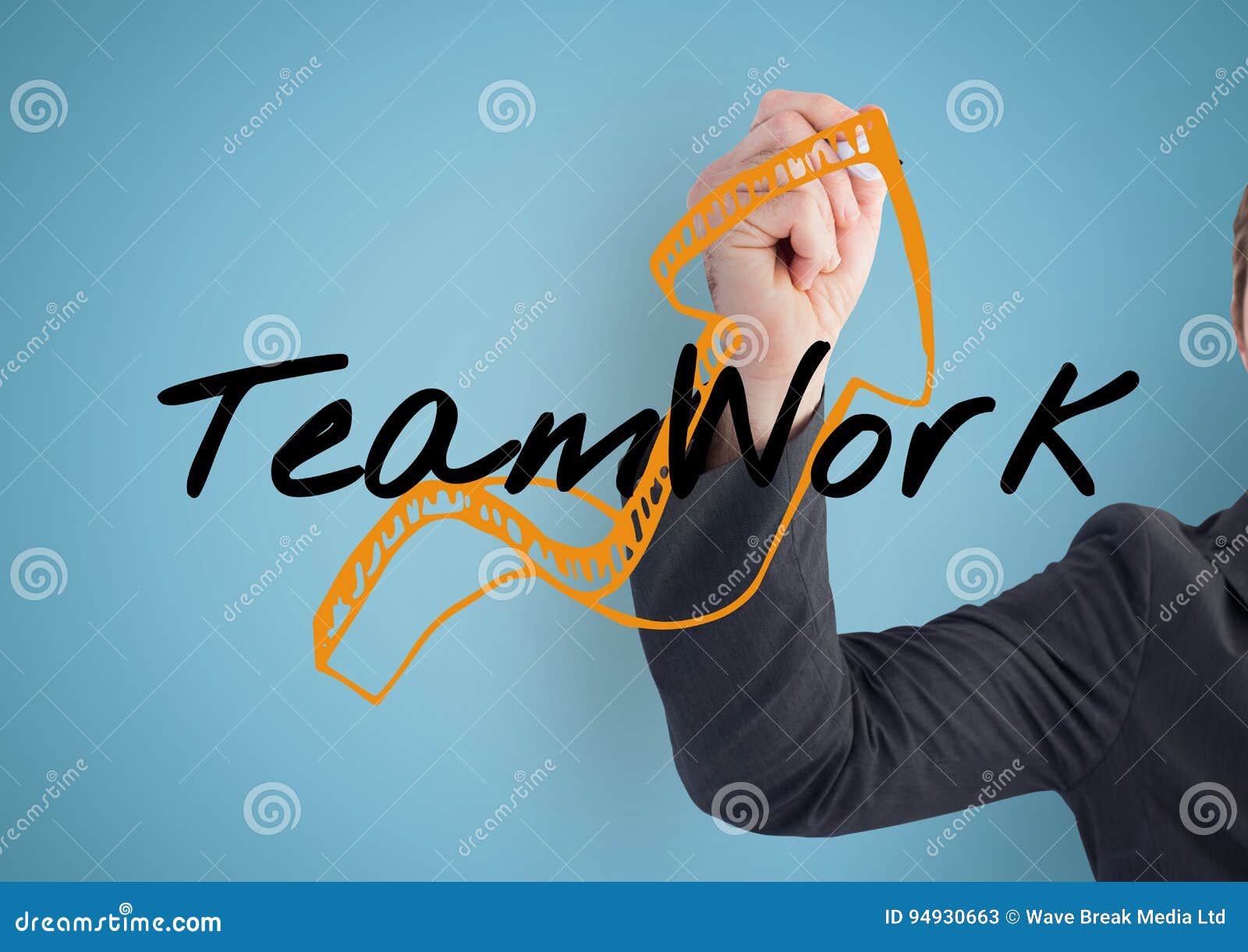 Businessman Hand Finishing the Arrow of the Graphic about TEAM WORK ...