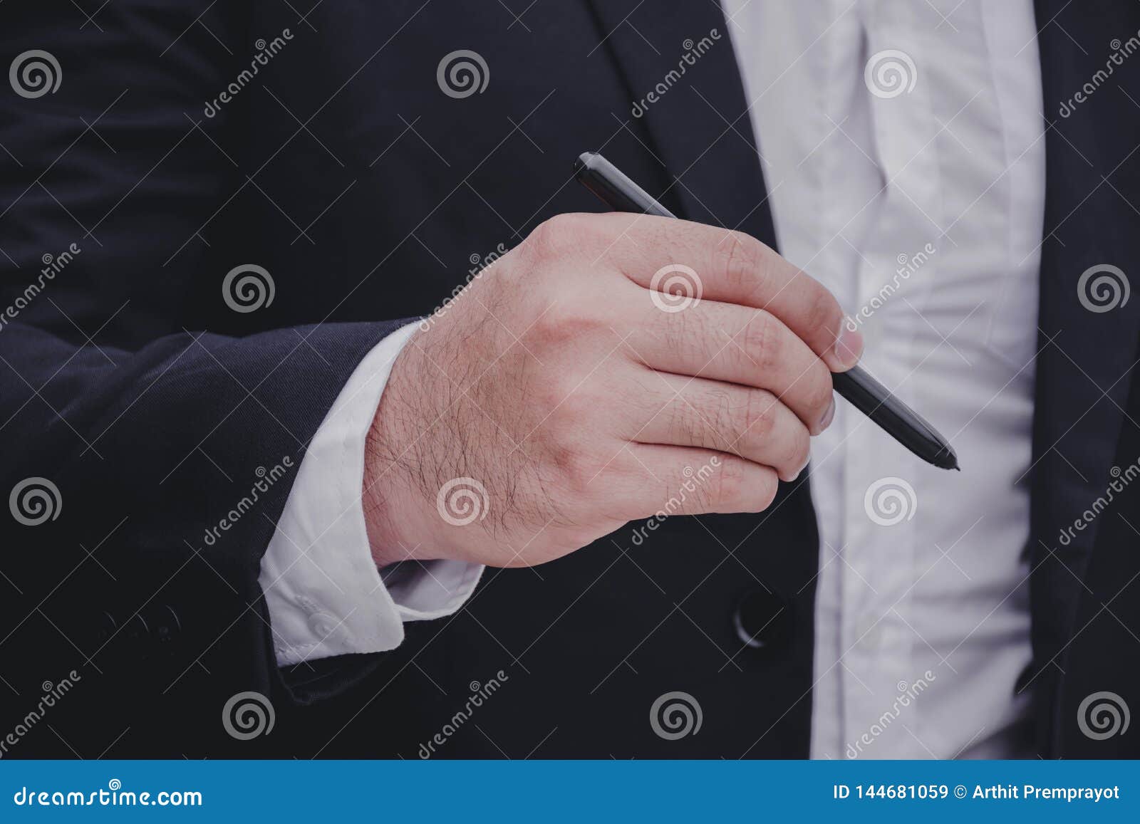 Businessman Hand Hold a Pen To Sign Documents Stock Image - Image of ...