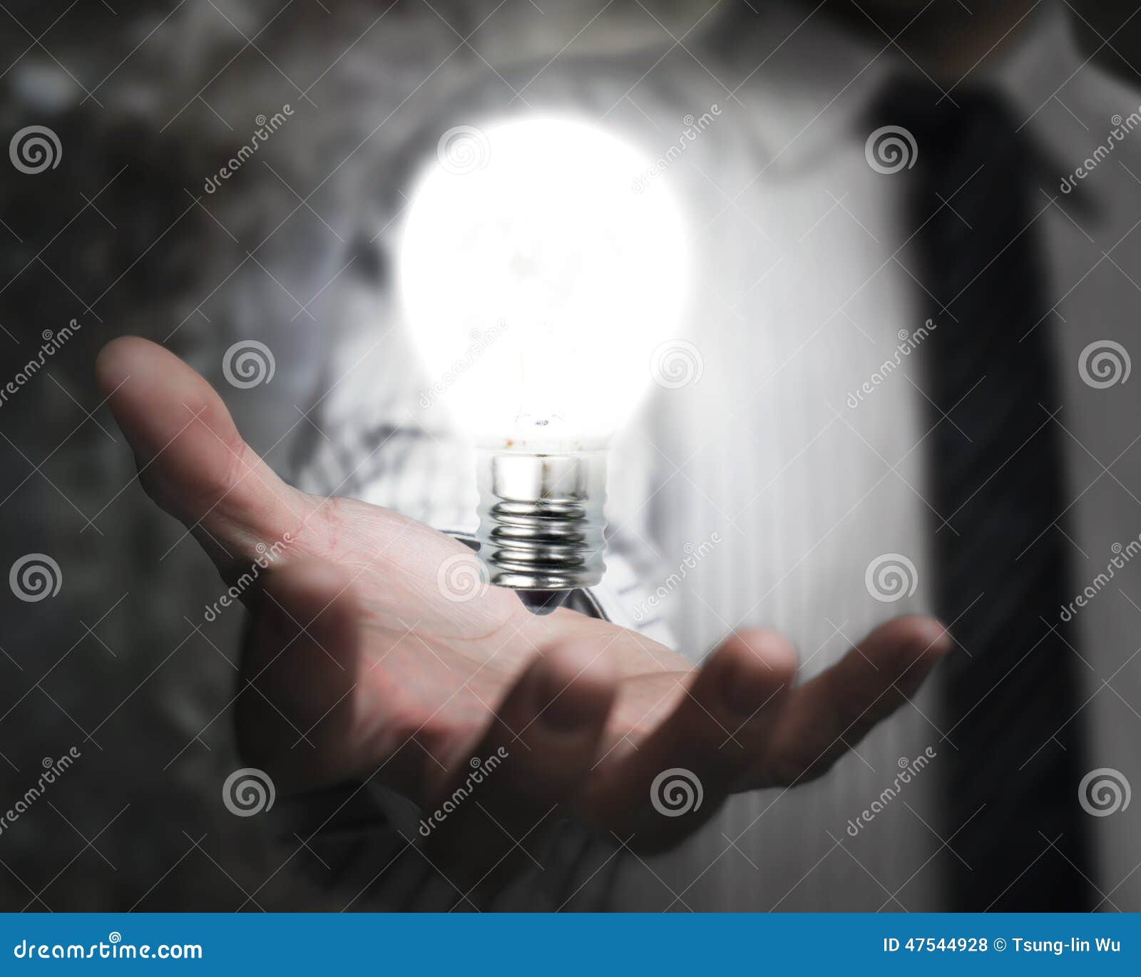 Businessman Hand Holding Brightly Light Bulb Illuminated Dark Stock ... Businessman Hand Holding Brightly Light Bulb Illuminated Dark Stock ...