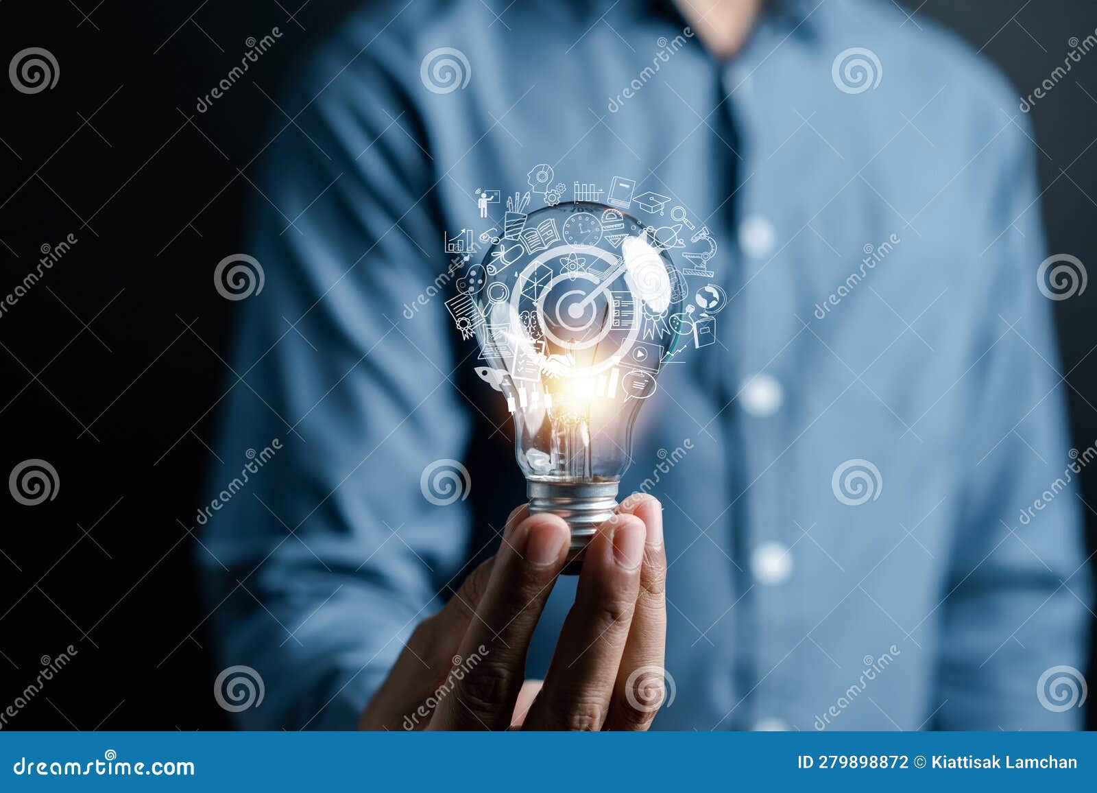 Businessman Hand Holding Lightbulb with Target Objective Inside, New ...