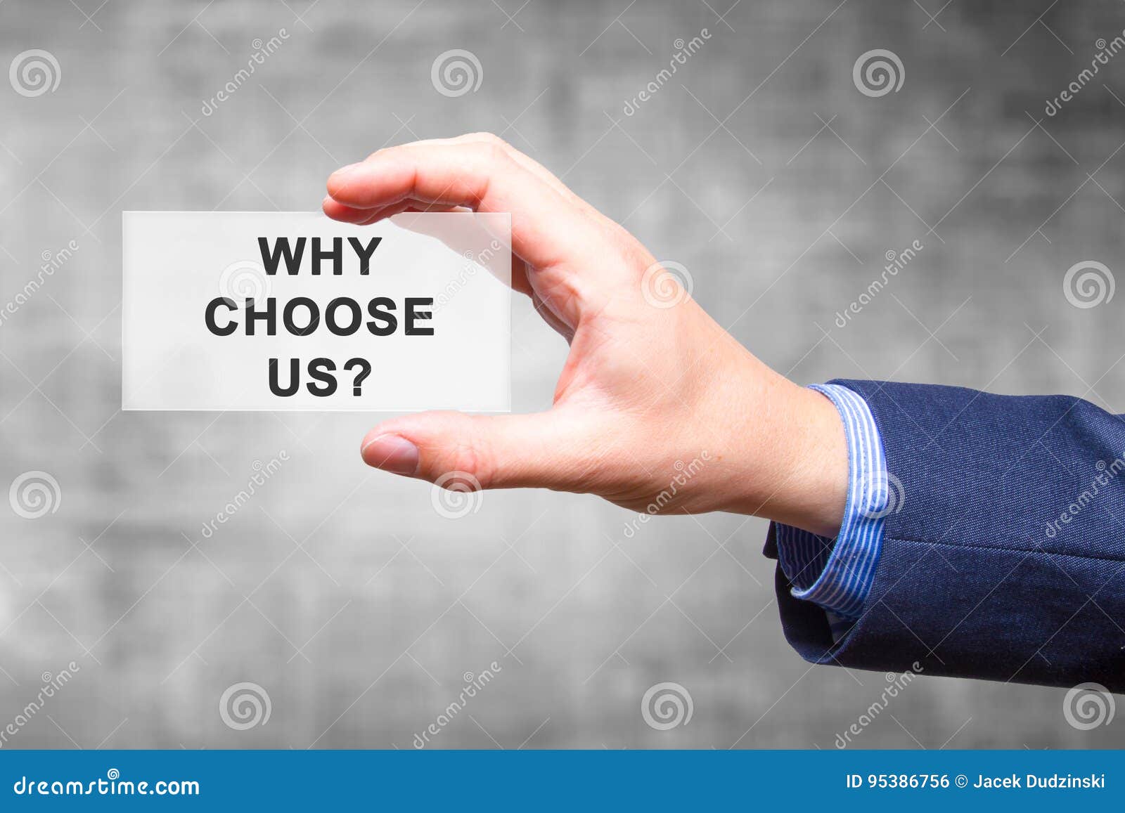 Businessman Hand Holding Why Choose Us? Sign Isolated on Grey Ba Stock ... Businessman Hand Holding Why Choose Us? Sign Isolated on Grey Ba Stock ...