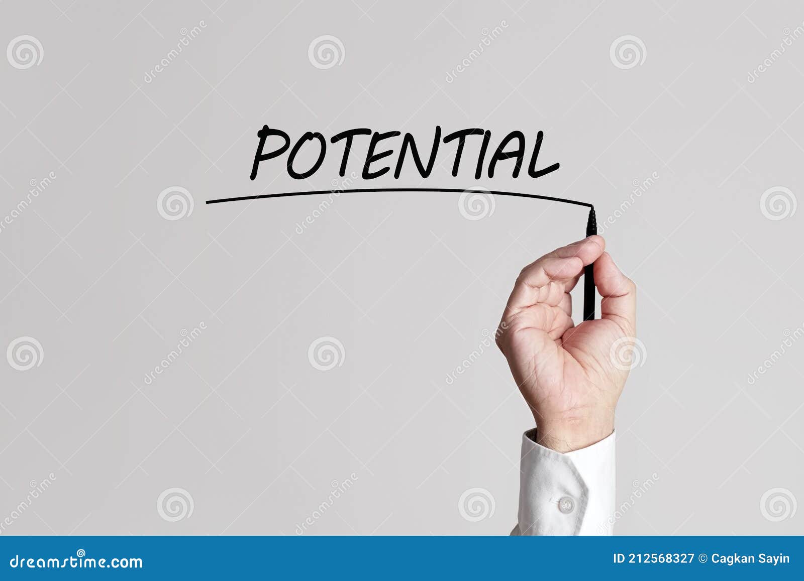 Businessman Hand with Pen Underlines the Word Potential on a Gray ...
