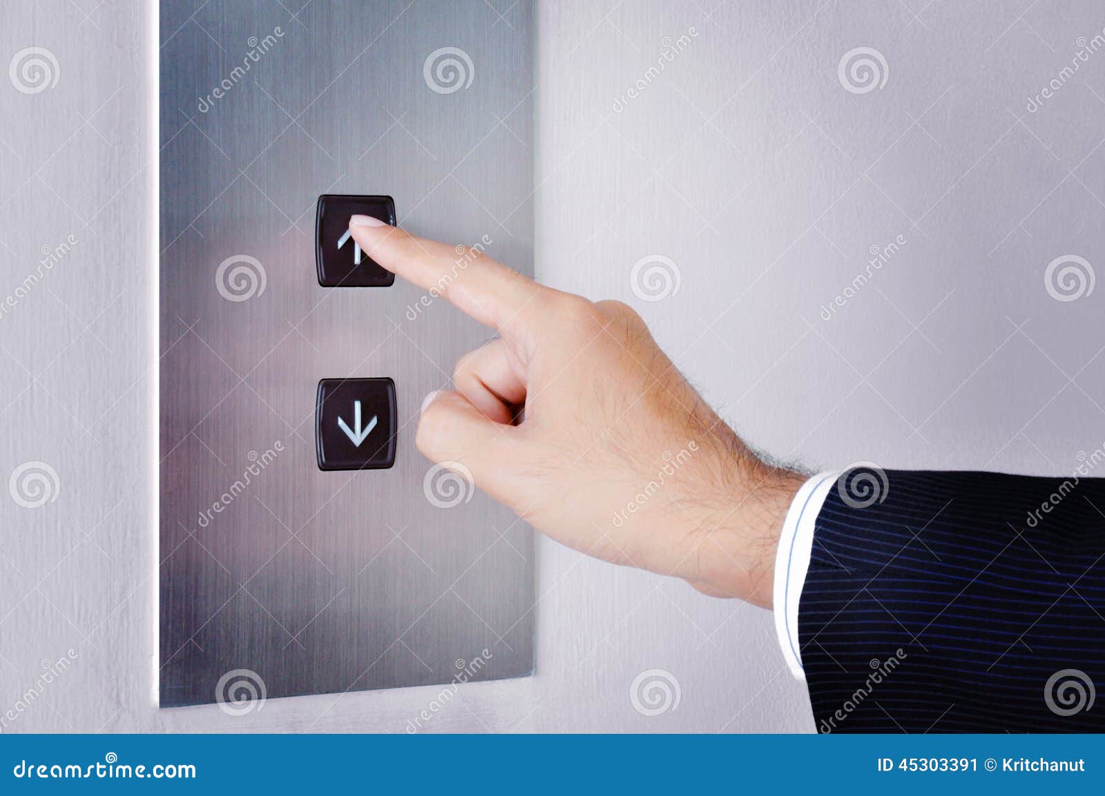 Businessman Hand Touching Going Up Sign on Lift Control Panel Stock ...