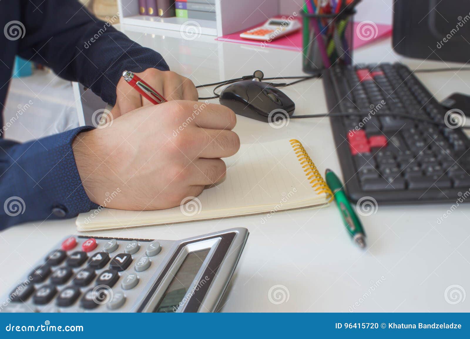 Businessman Hand Using Pen for Writing Data Information on Paperwork ...