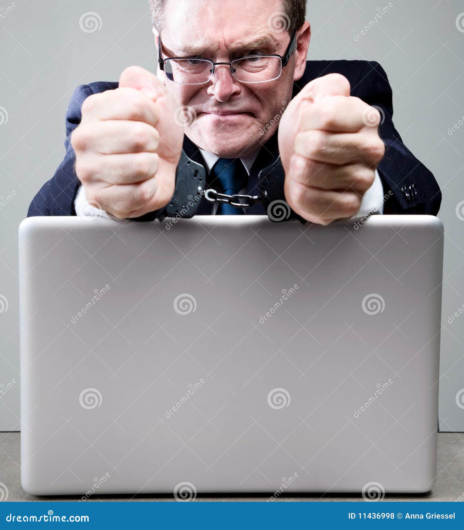 Businessman in handcuffs stock photo. Image of expression - 11436998