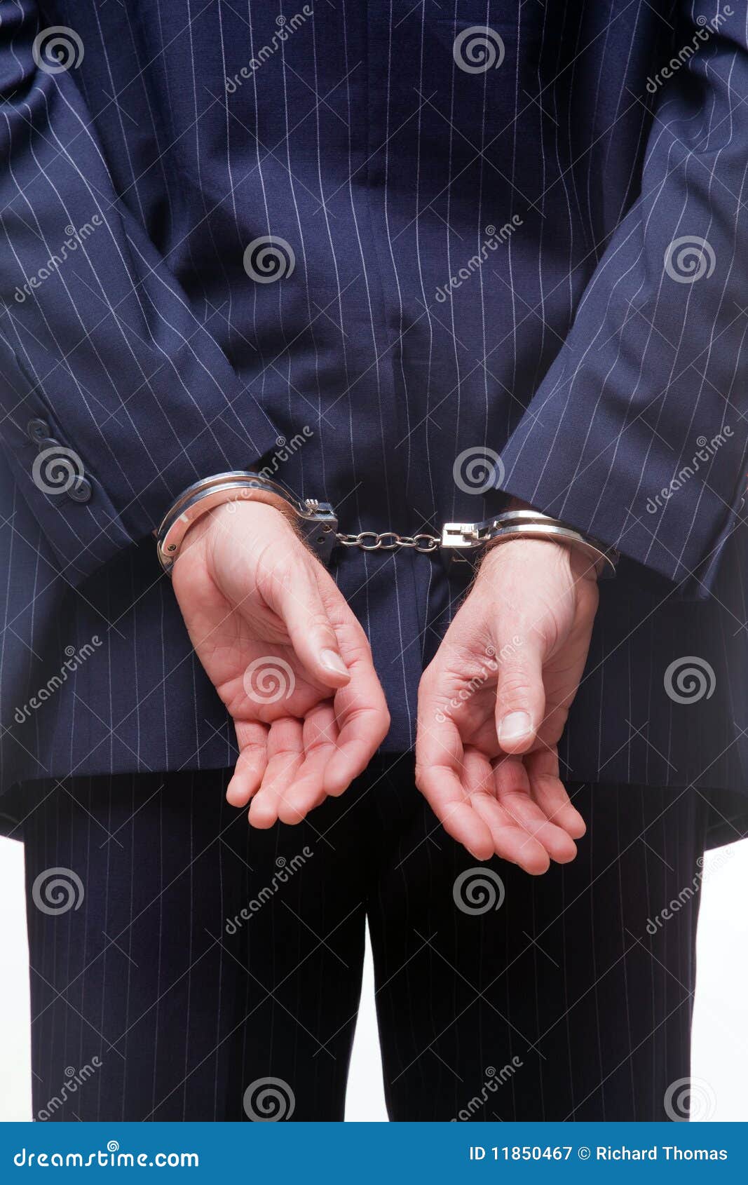 Businessman in handcuffs stock image. Image of detained - 11850467