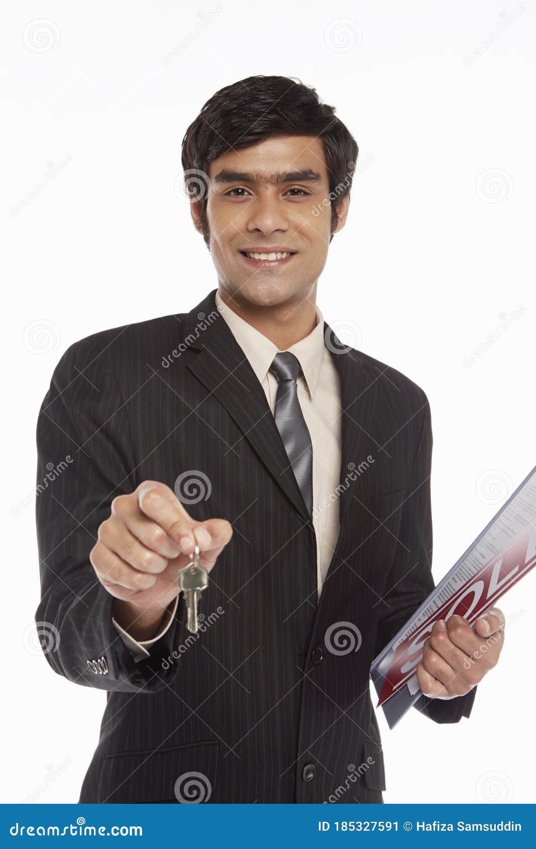 Businessman Handing Out a Set of Keys Stock Image - Image of business ...