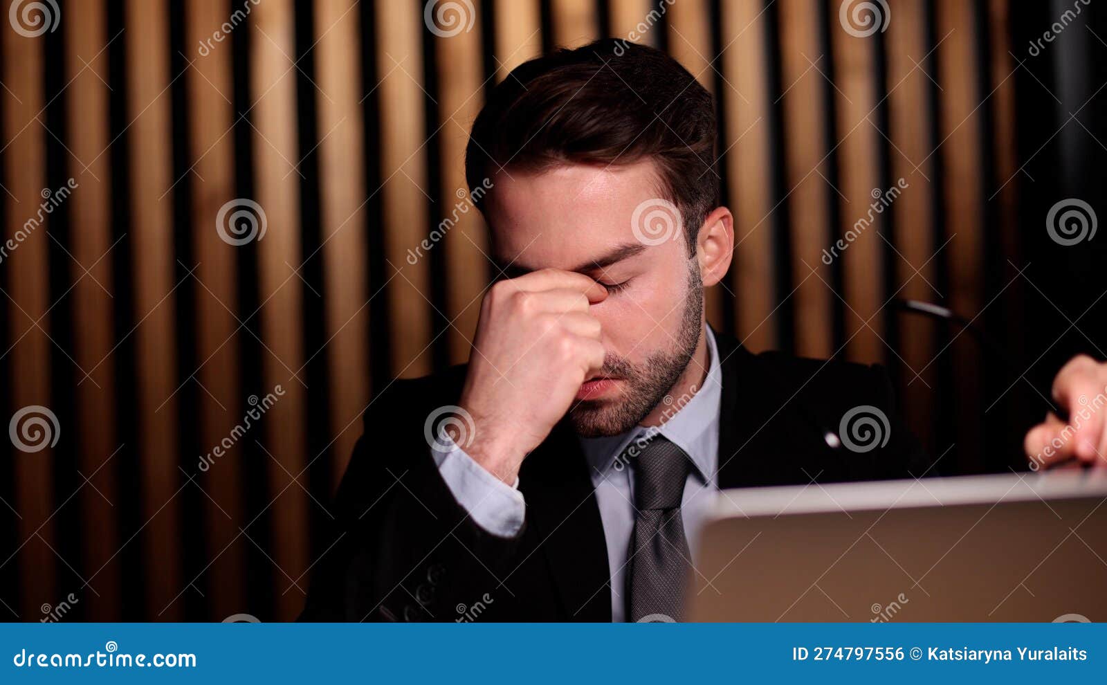 Tired Man Behind a Computer Screen from Boring Routine Work in the ...