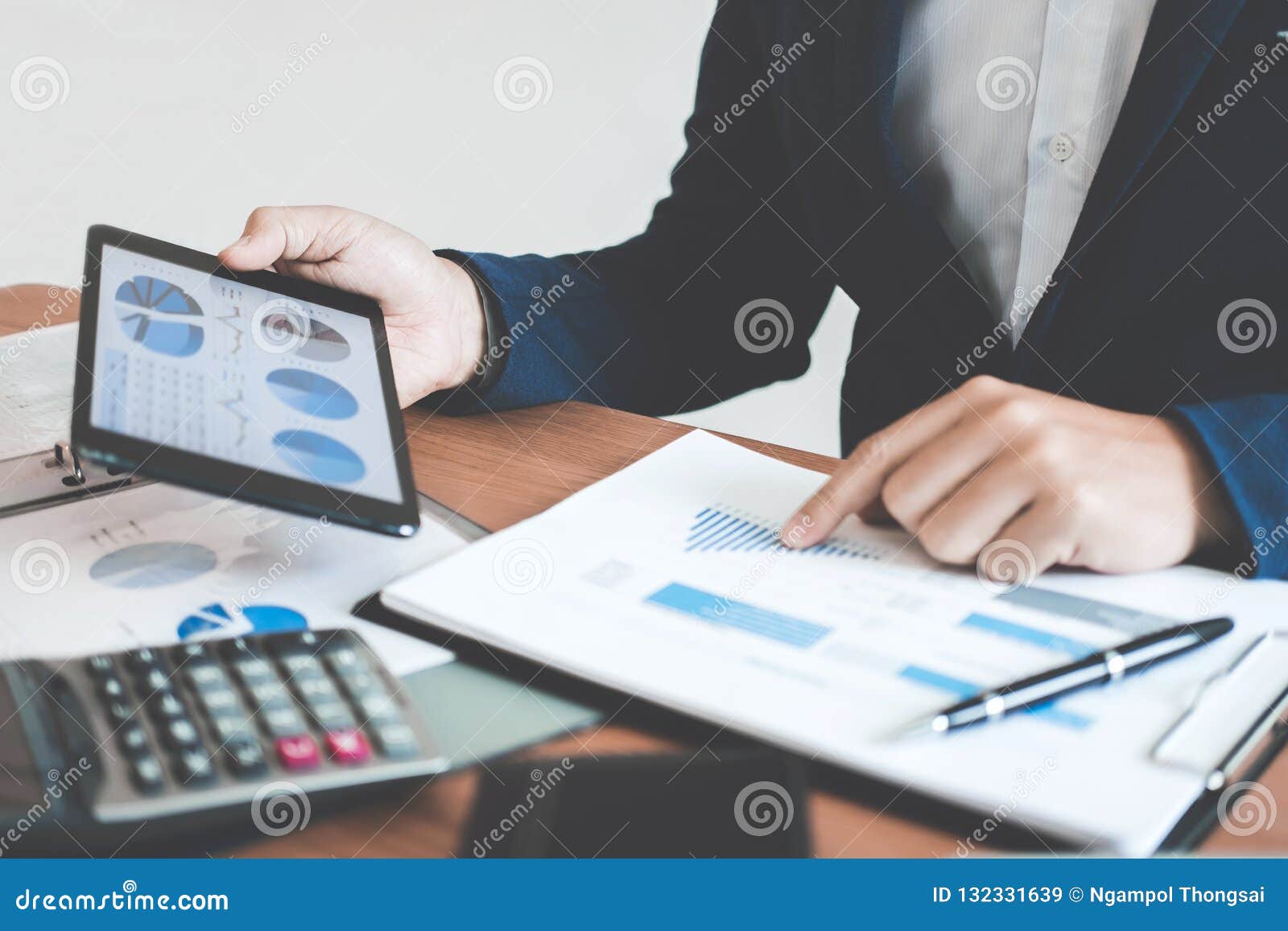 Businessman Hands Using Text Information on Digital Tablet To an Stock ...