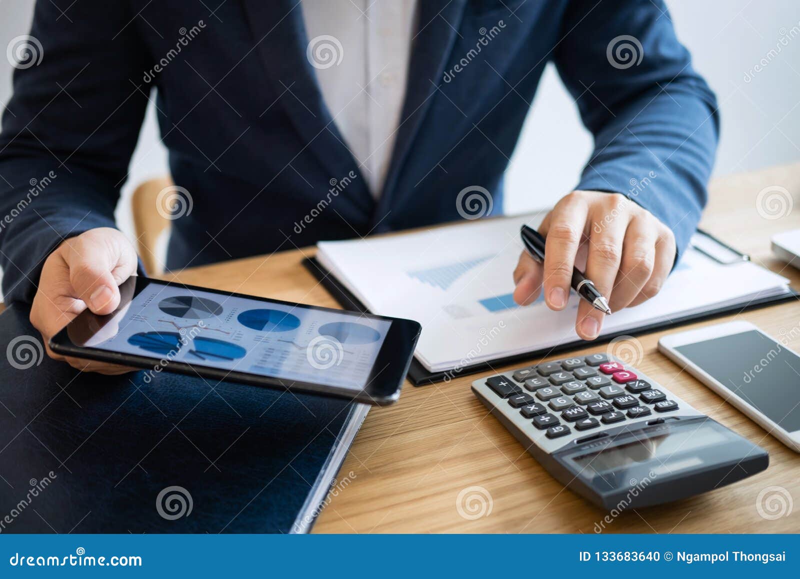 Businessman Hands Using Text Information on Digital Tablet To an Stock ...