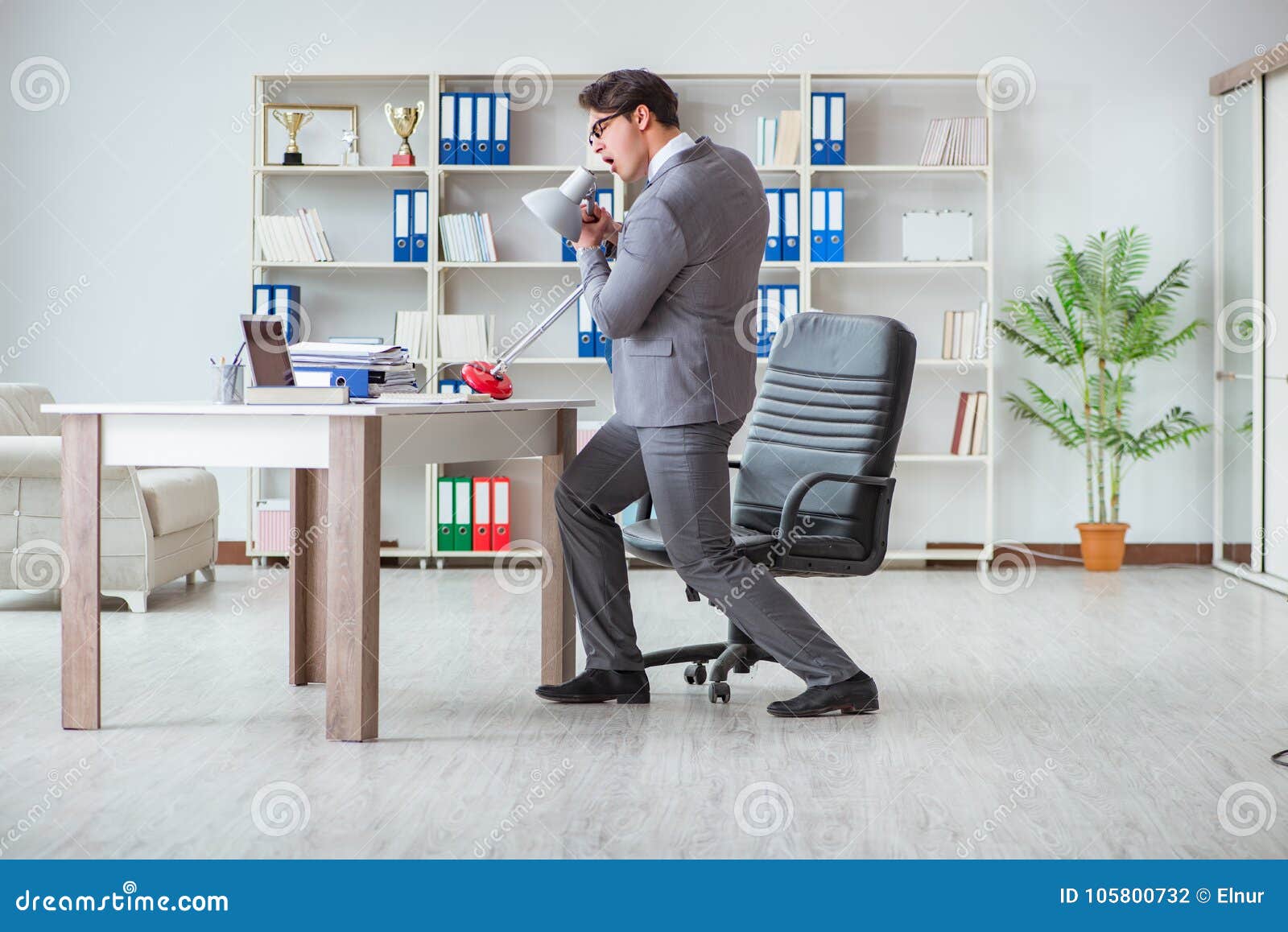 The Businessman Having Fun Taking a Break in the Office at Work Stock ... The Businessman Having Fun Taking a Break in the Office at Work Stock ...