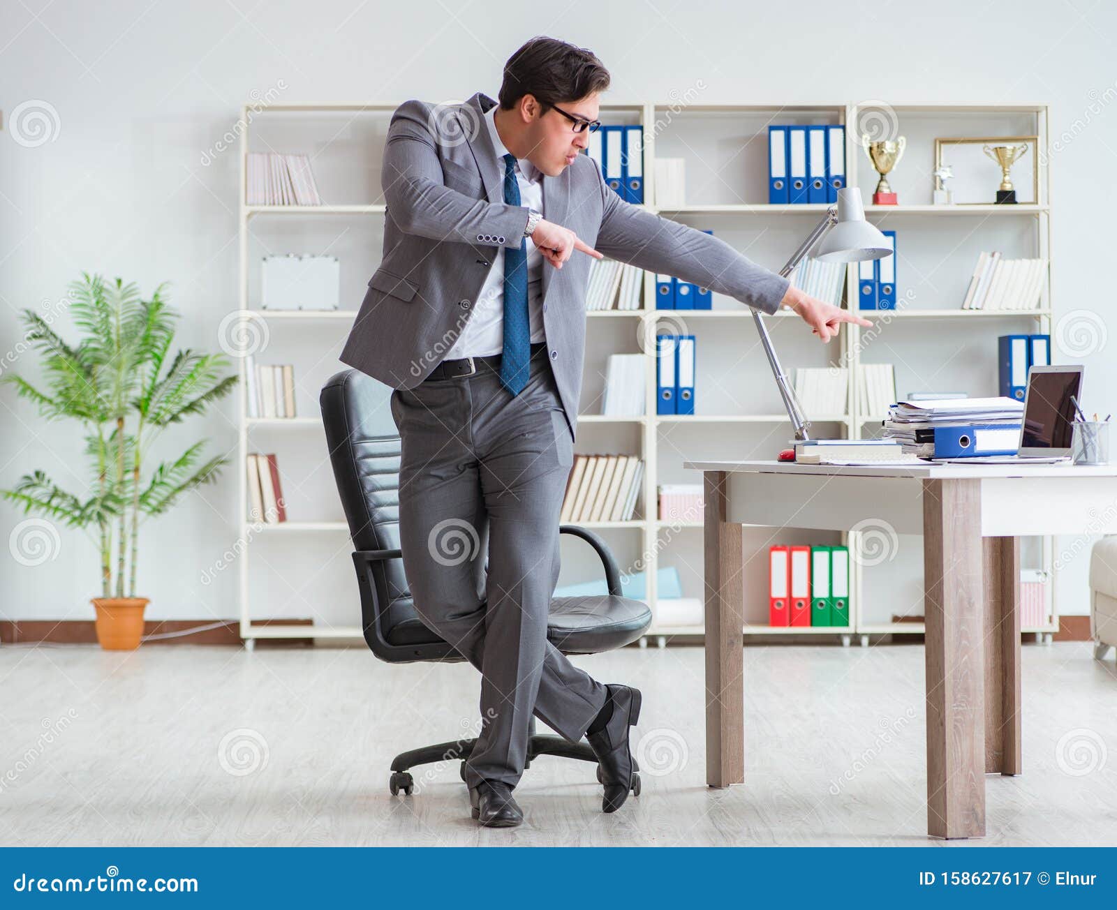 Businessman Having Fun Taking a Break in the Office at Work Stock Image ... Businessman Having Fun Taking a Break in the Office at Work Stock Image ...