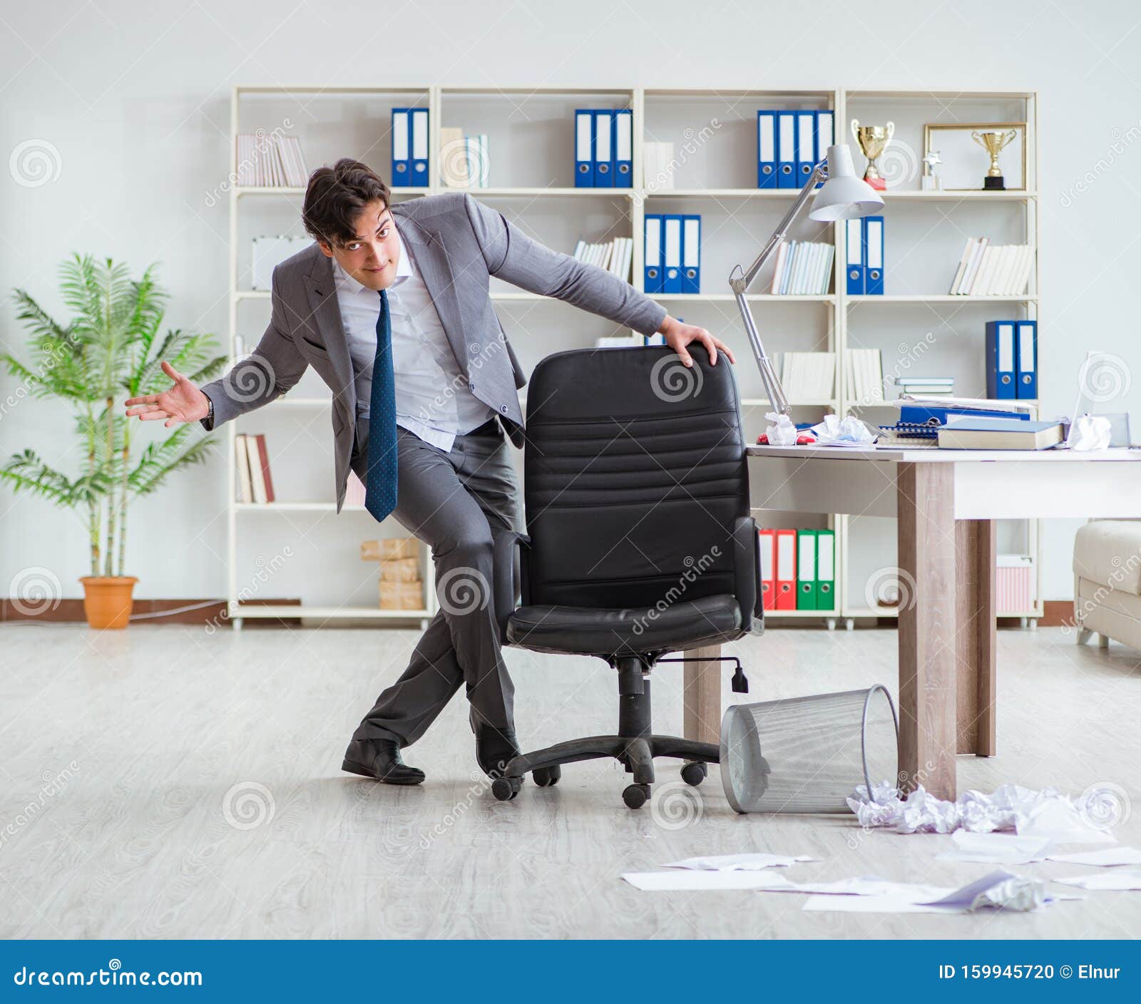 Businessman Having Fun Taking a Break in the Office at Work Stock Photo ... Businessman Having Fun Taking a Break in the Office at Work Stock Photo ...