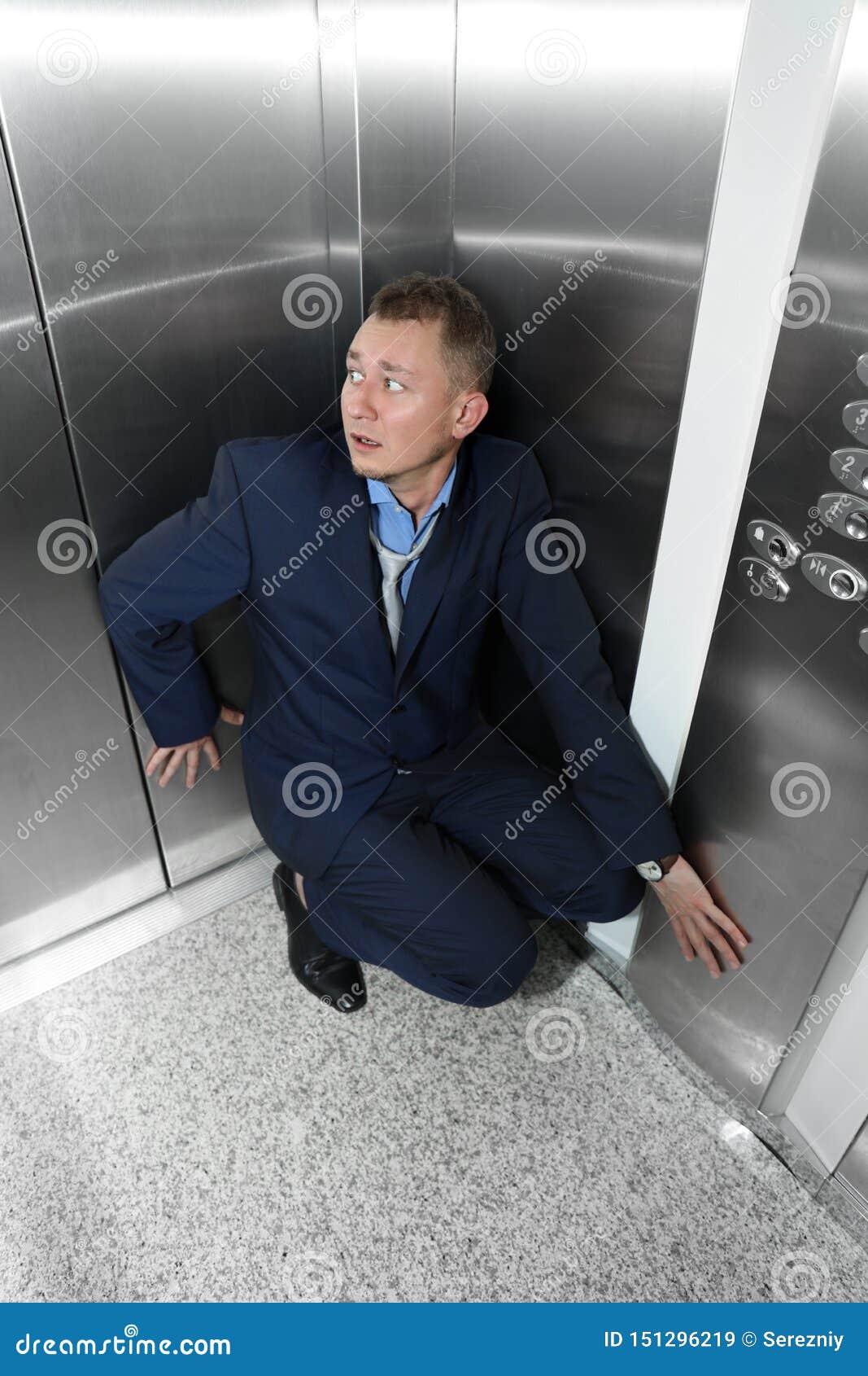 Businessman Having Panic Attack in Elevator Stock Image - Image of ...