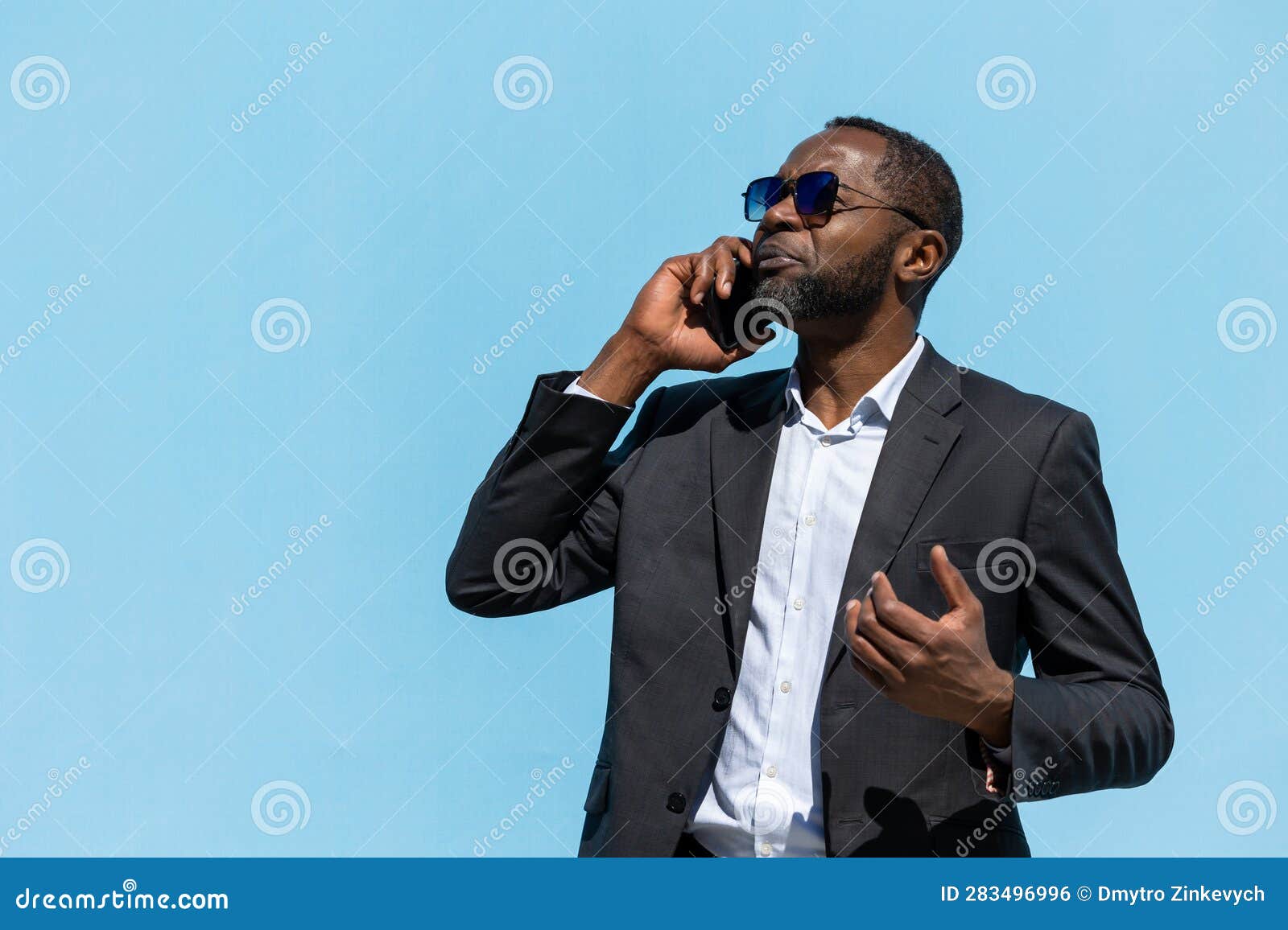 Businessman Having a Phone Call and Looking Involved Stock Photo ...