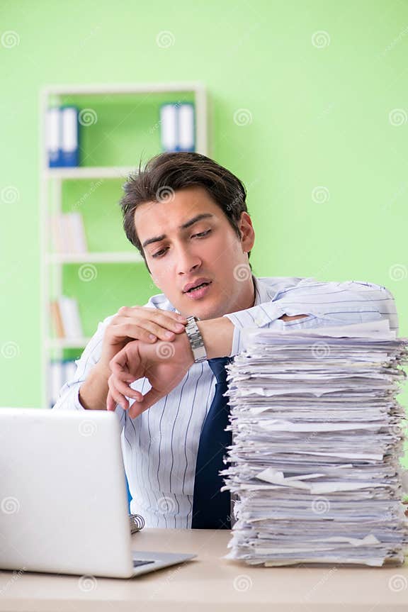 The Businessman Having Problems with Paperwork and Workload Stock Image ...
