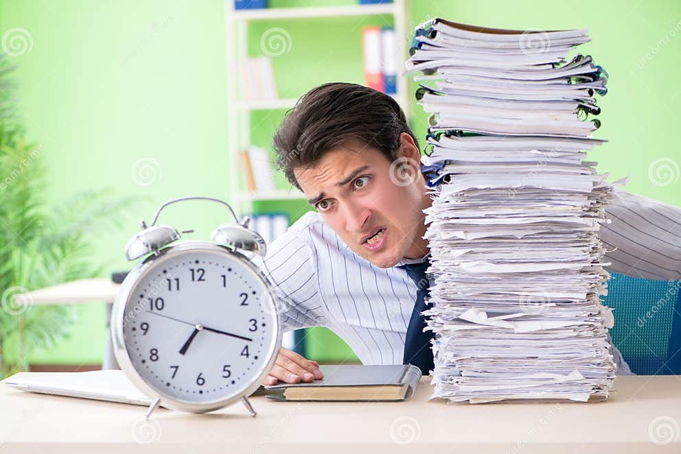 The Businessman Having Problems with Paperwork and Workload Stock Image ...