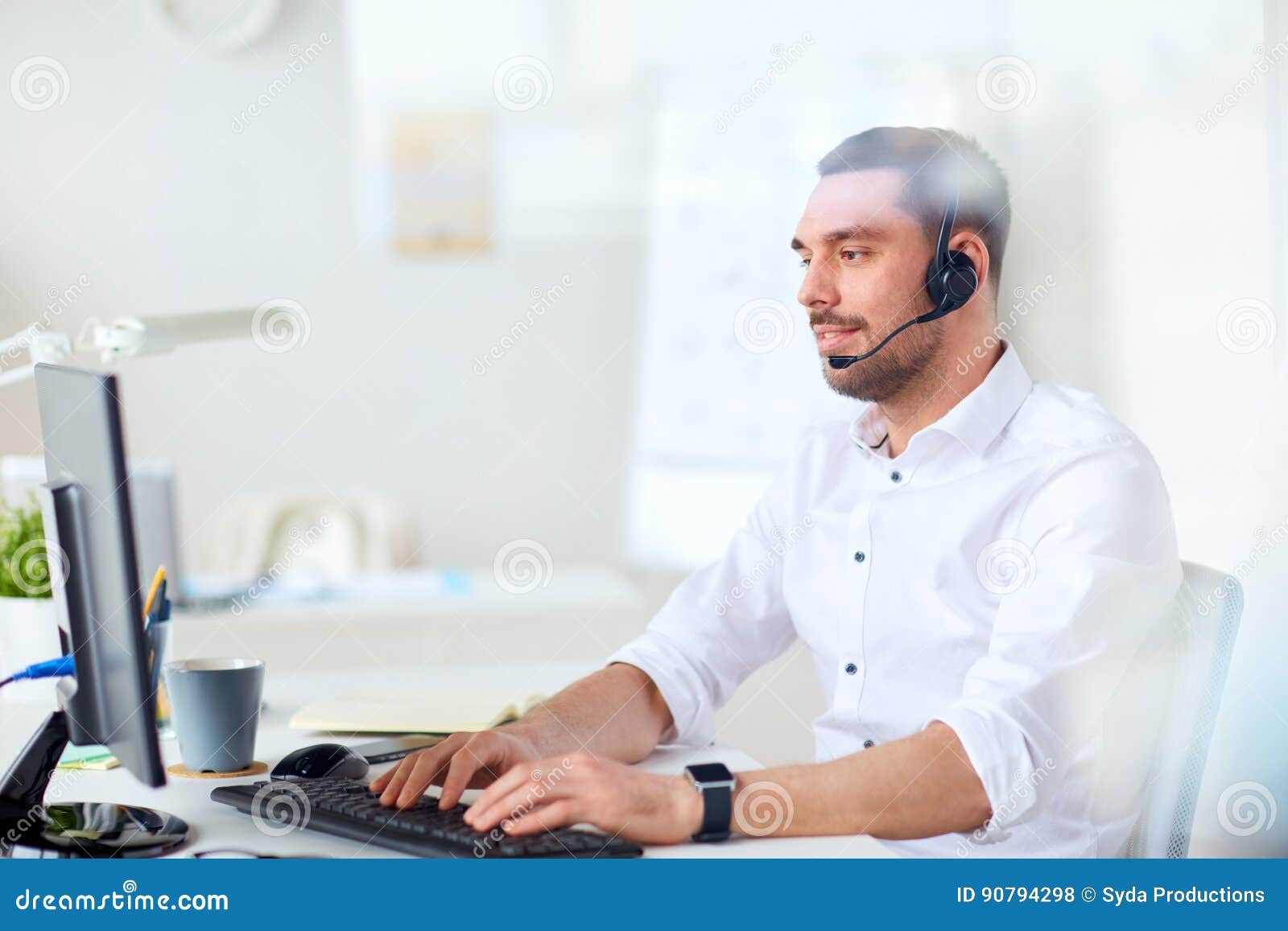 Businessman with Headset and Computer at Office Stock Photo - Image of ...
