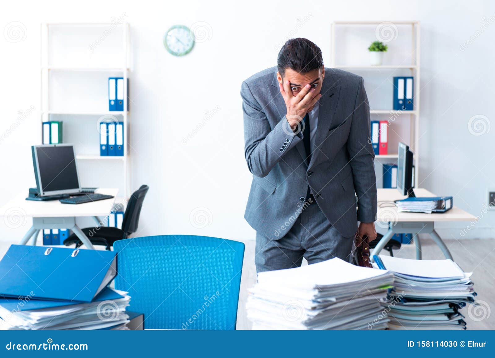 Businessman with Heavy Paperwork Workload Stock Photo - Image of ...