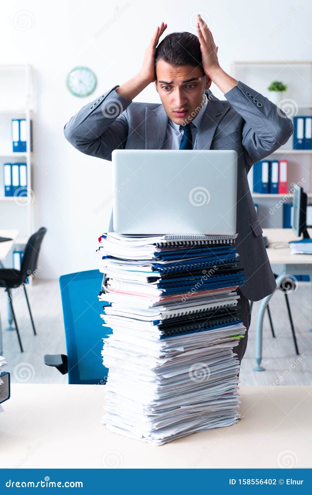 Businessman with Heavy Paperwork Workload Stock Photo - Image of ...