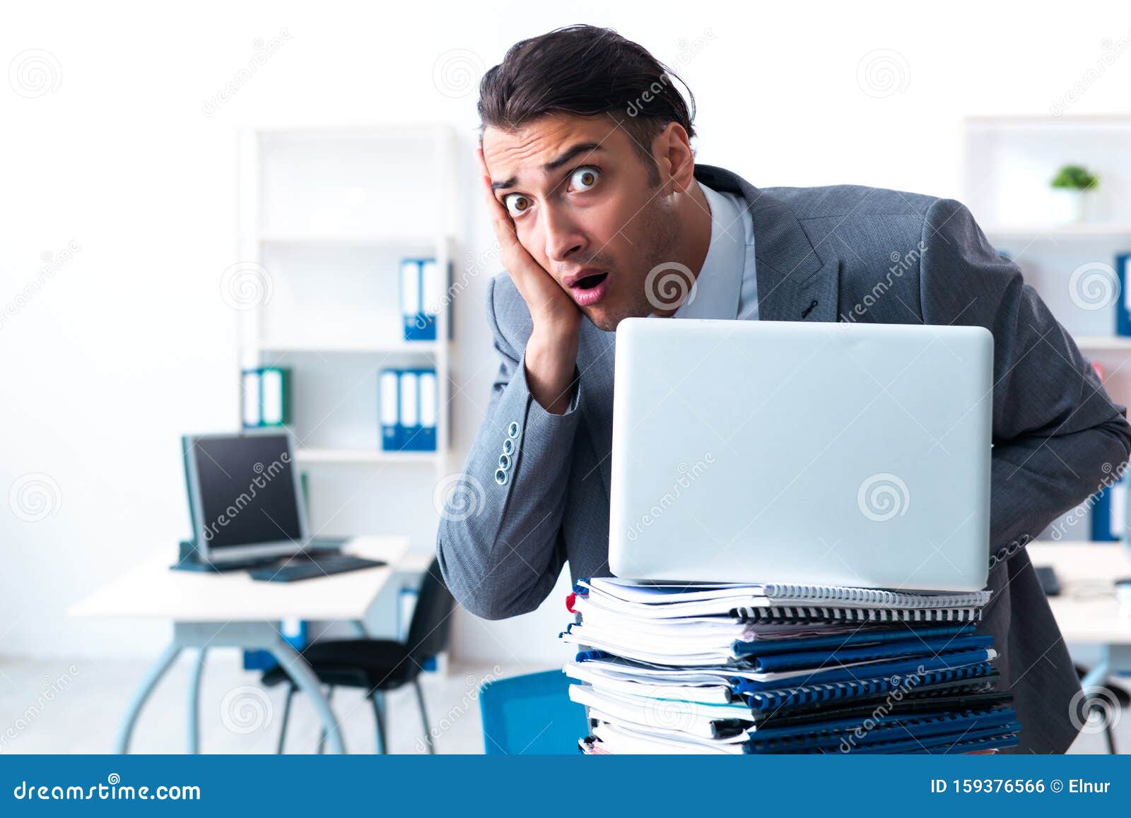 Businessman with Heavy Paperwork Workload Stock Photo - Image of office ...
