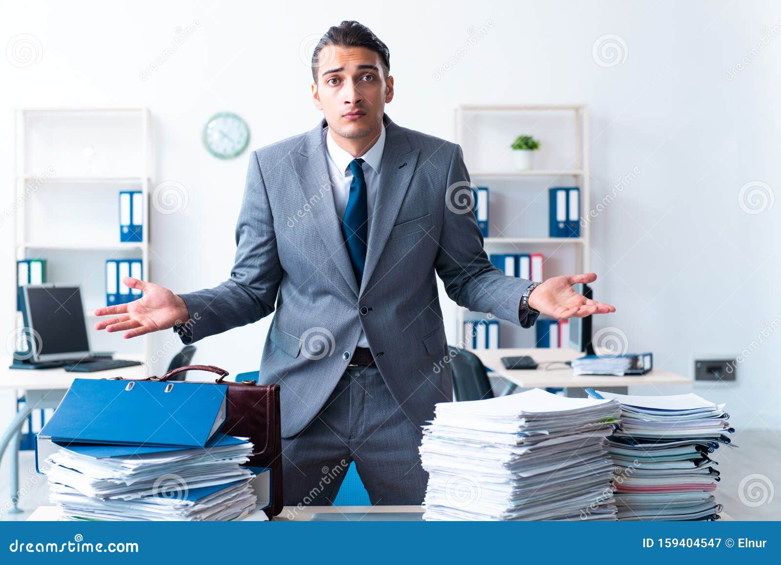 Businessman with Heavy Paperwork Workload Stock Image - Image of ...
