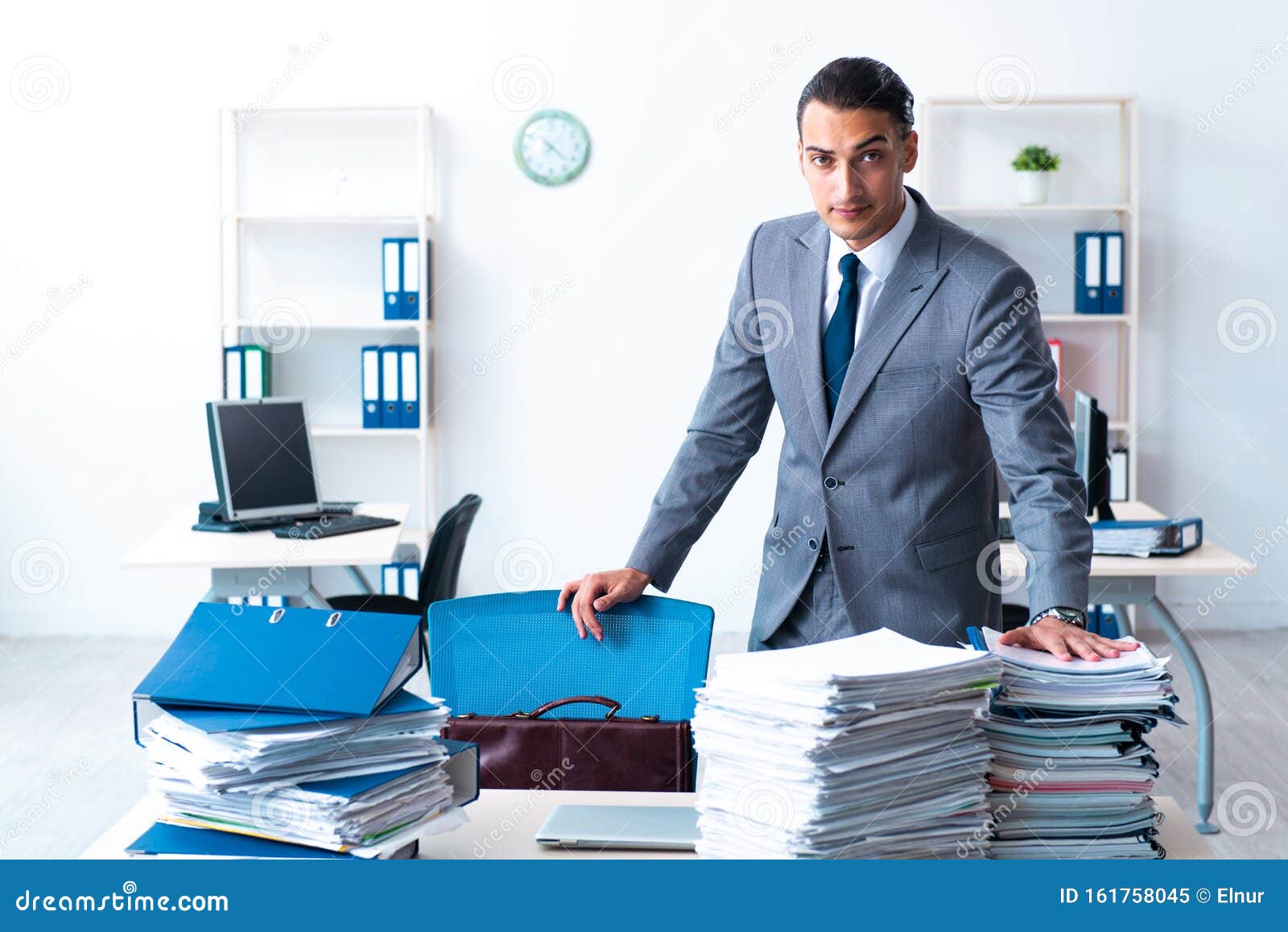 Businessman with Heavy Paperwork Workload Stock Image - Image of binder ...