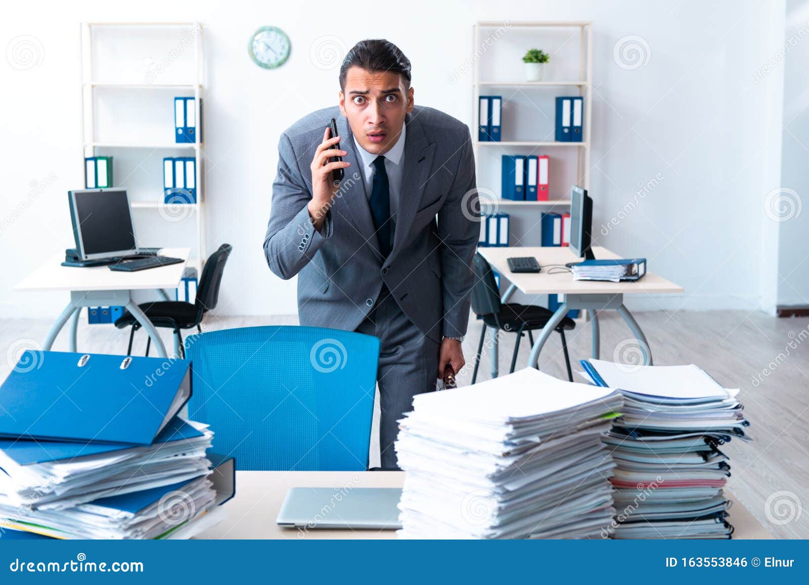 Businessman with Heavy Paperwork Workload Stock Photo - Image of ...