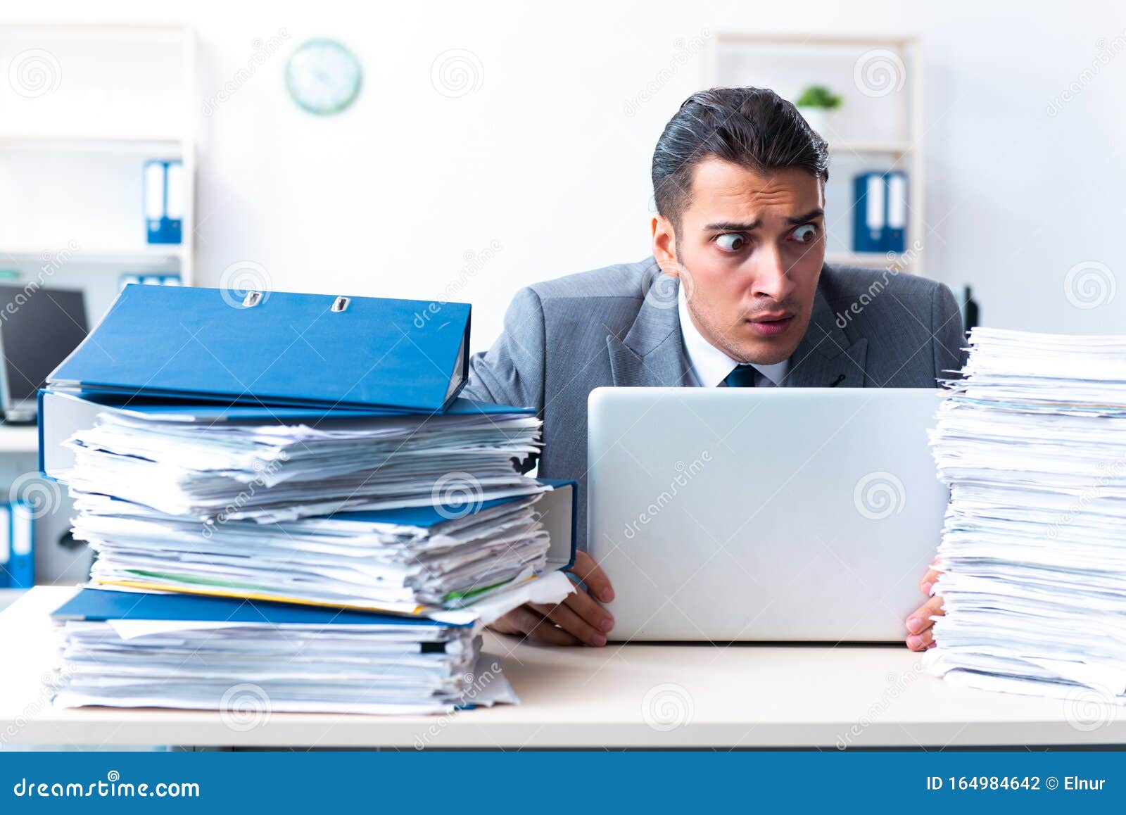 Businessman with Heavy Paperwork Workload Stock Photo - Image of ...