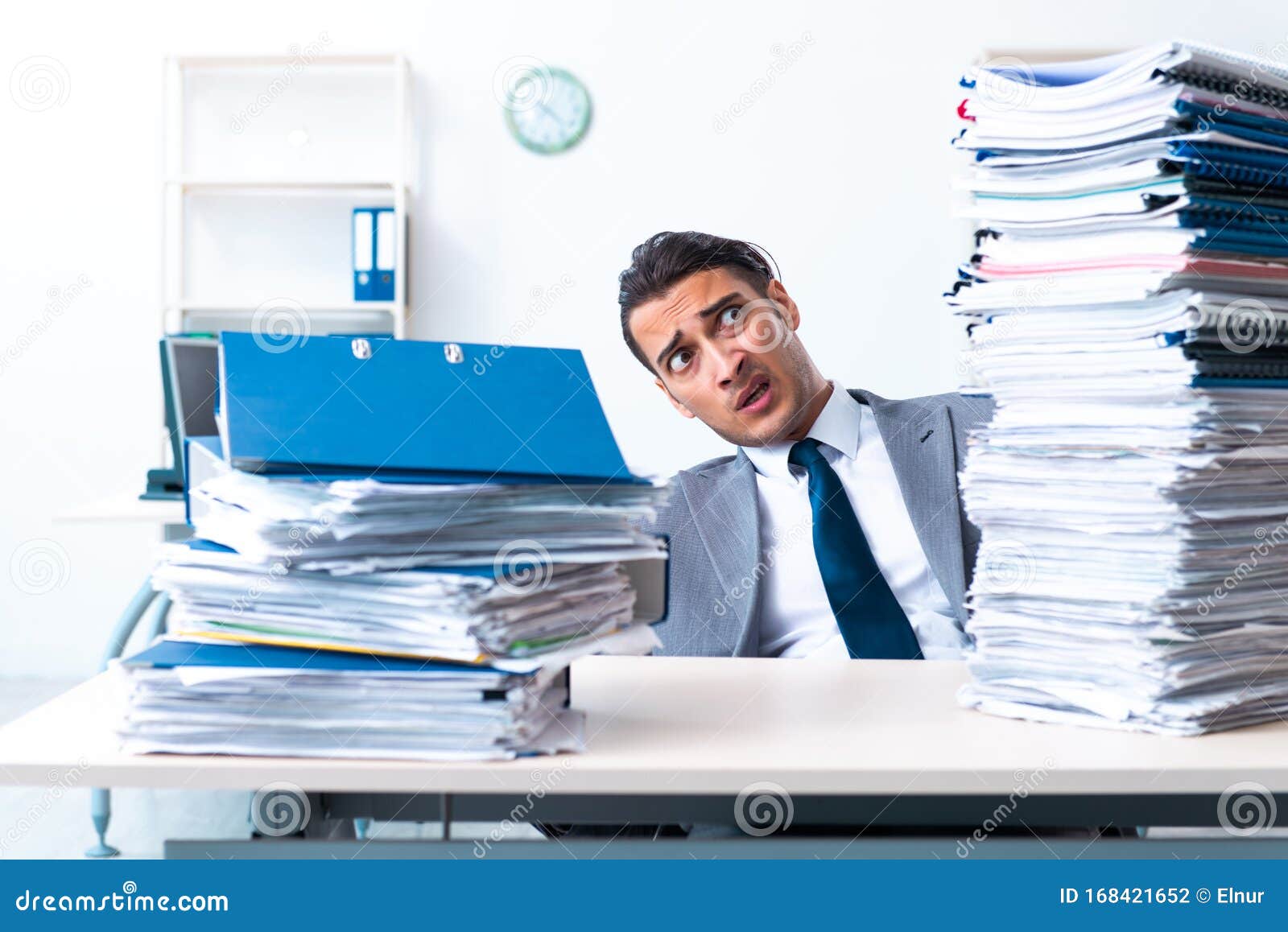 Businessman with Heavy Paperwork Workload Stock Photo - Image of ...