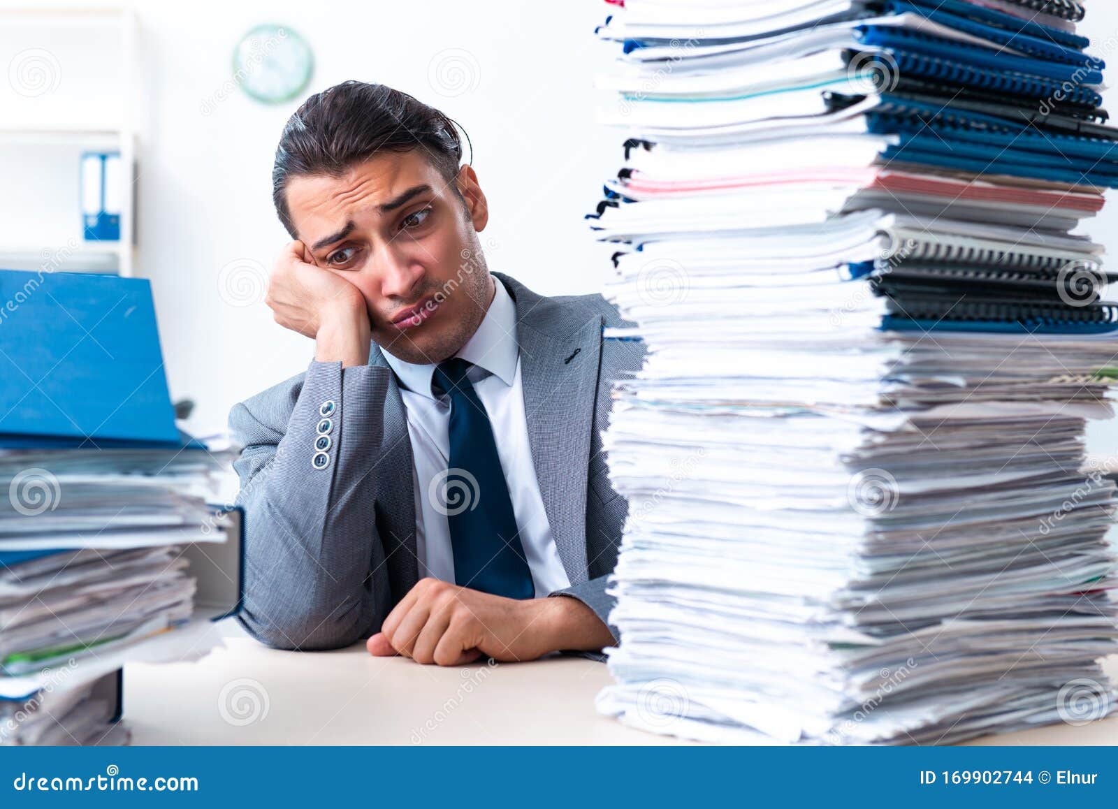 Businessman with Heavy Paperwork Workload Stock Photo - Image of office ...