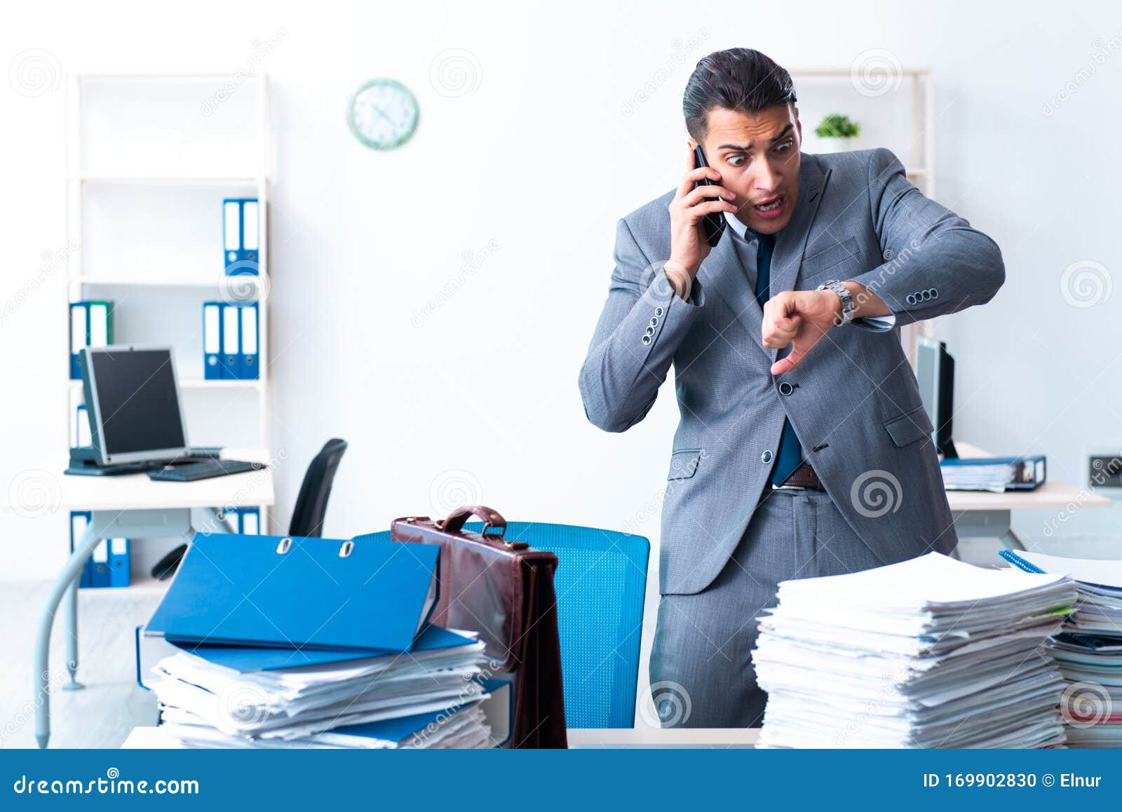 Businessman with Heavy Paperwork Workload Stock Photo - Image of busy ...