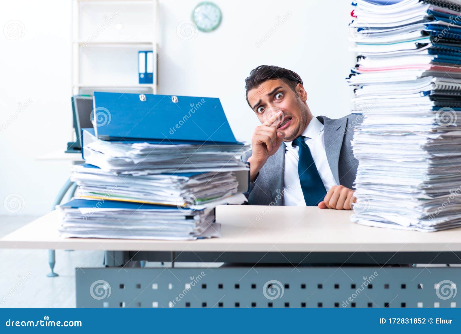 Businessman with Heavy Paperwork Workload Stock Photo - Image of ...