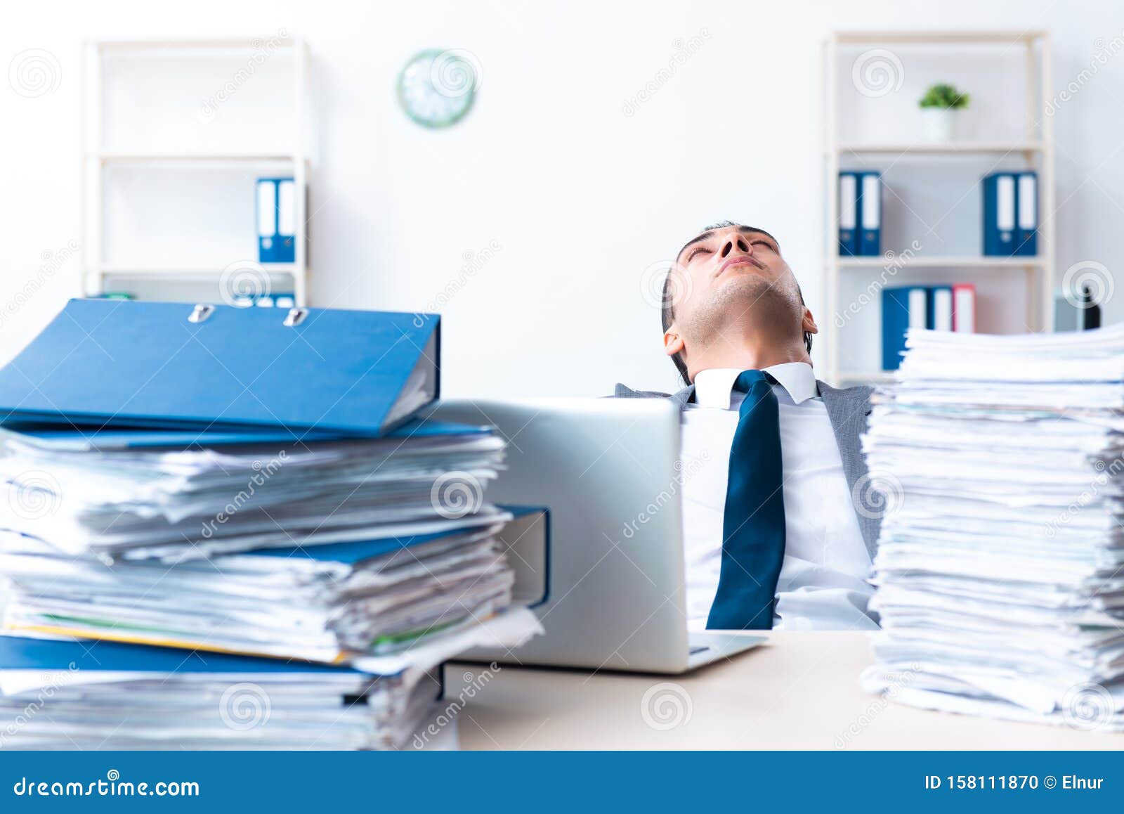 Businessman with Heavy Paperwork Workload Stock Photo - Image of ...