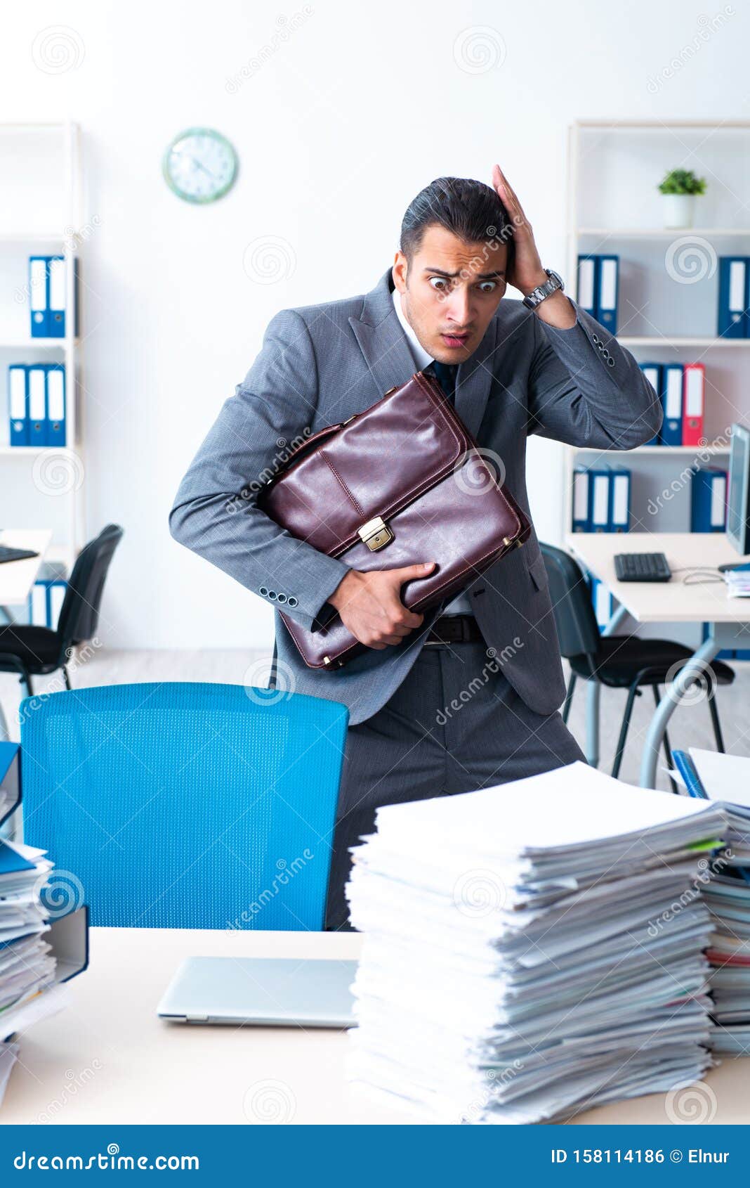 Businessman with Heavy Paperwork Workload Stock Photo - Image of ...