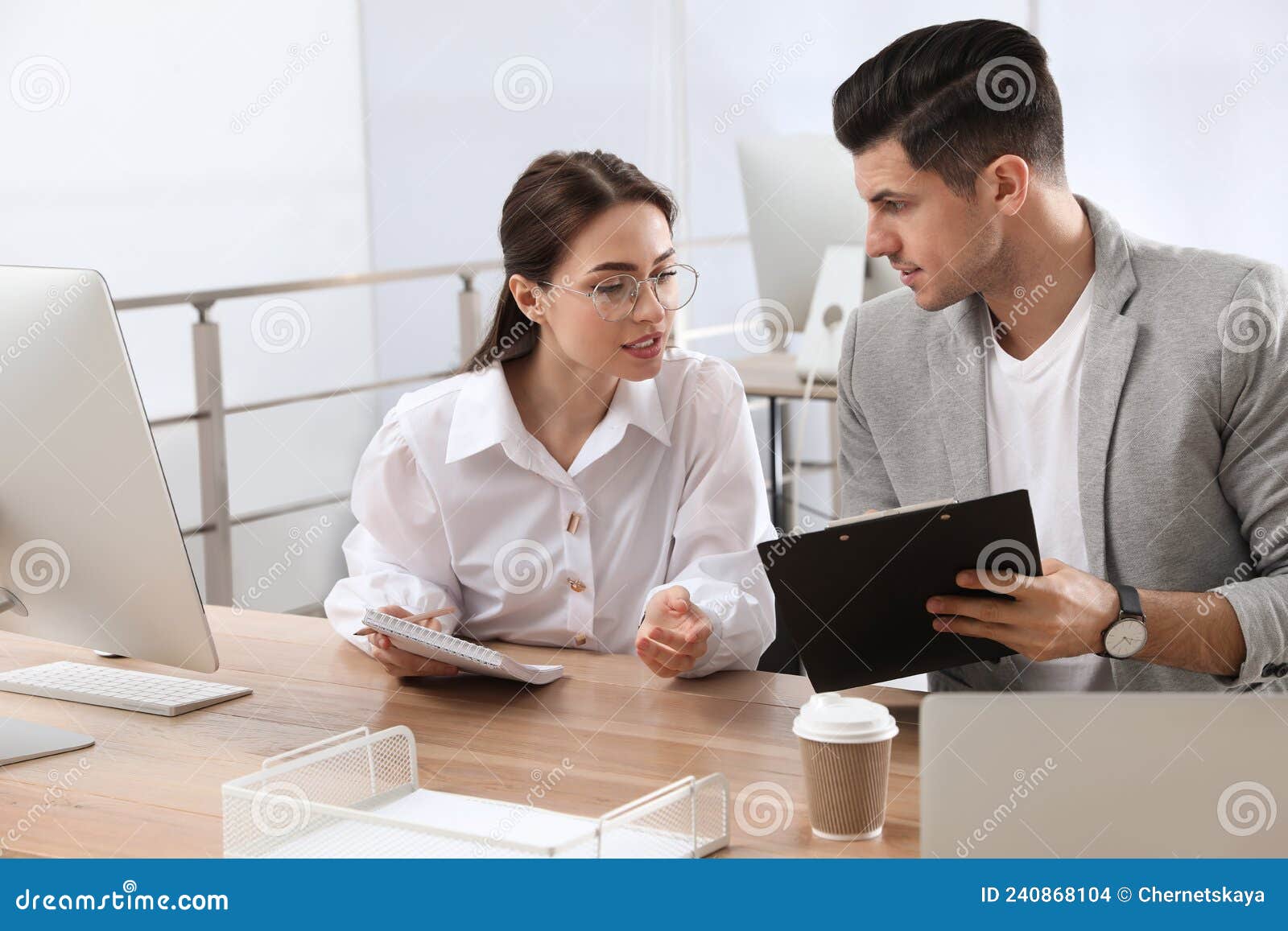 Businessman Helping Intern with Work in Office Stock Photo - Image of ...