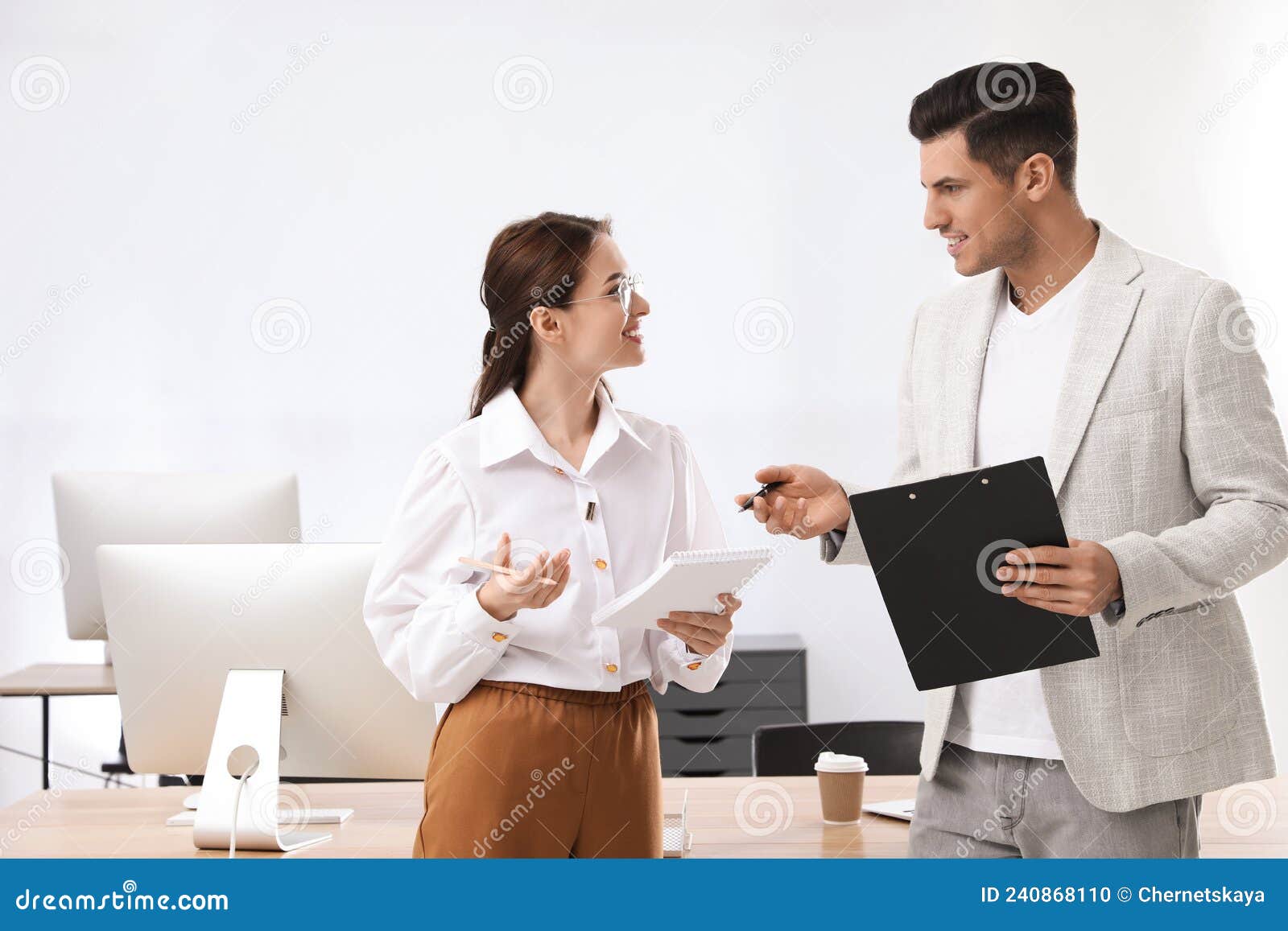 Businessman Helping Intern with Work in Office Stock Photo - Image of ...