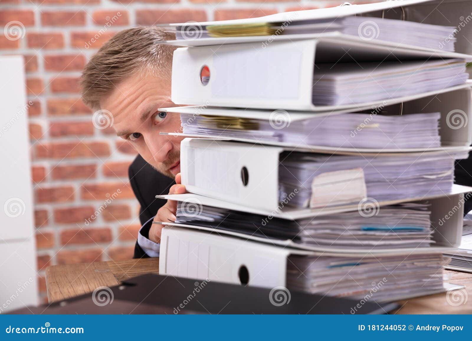 Businessman Hiding Behind the Folders Stack Stock Photo - Image of ...