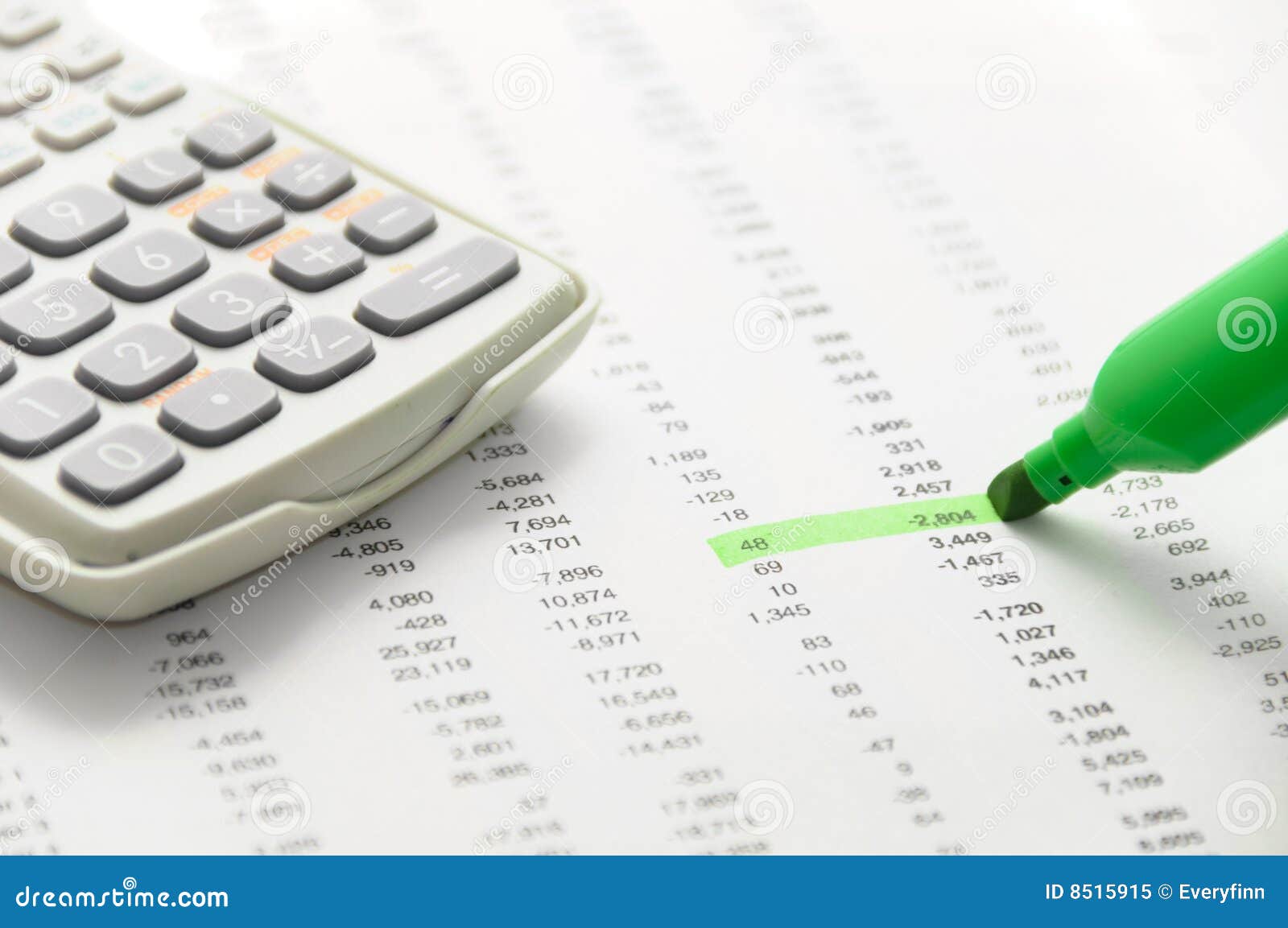 Businessman Highlighting Financial Figures Stock Image - Image of ...