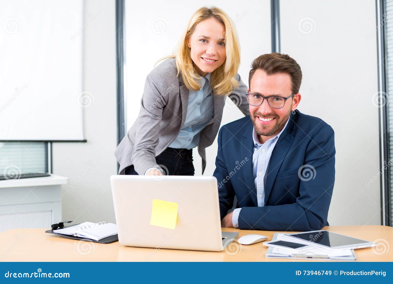Businessman and His Assistant Working Together at the Office Stock ...