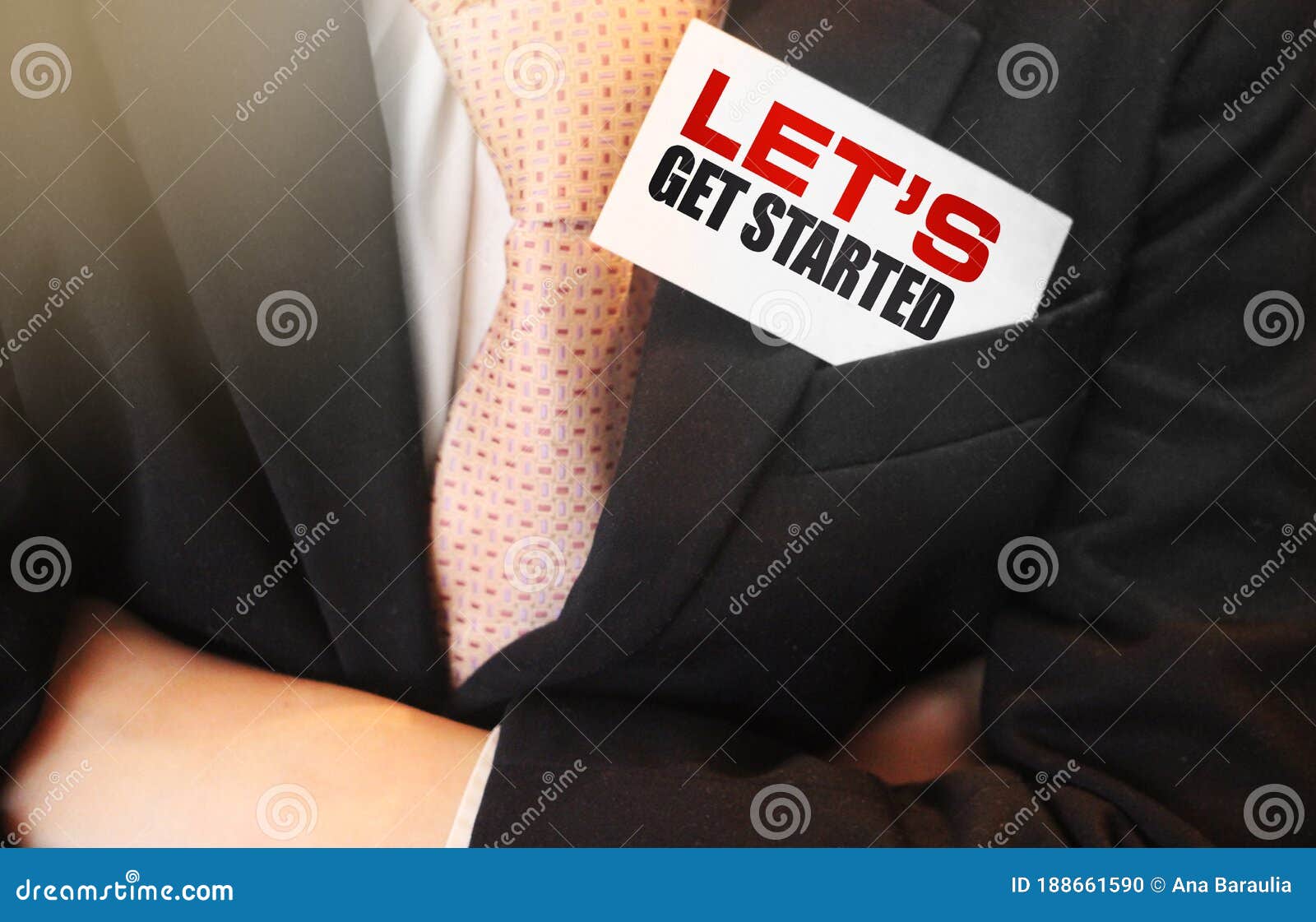 Businessman Hold Card with Text Let Us Get Started Text on it. Business ...