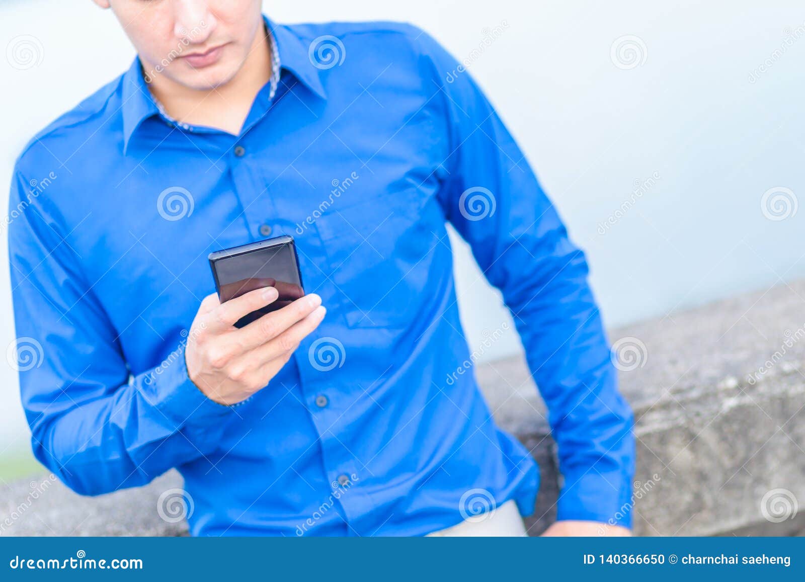 Businessman Hold Mobile Phone for Check Message, E-mail and Working ...