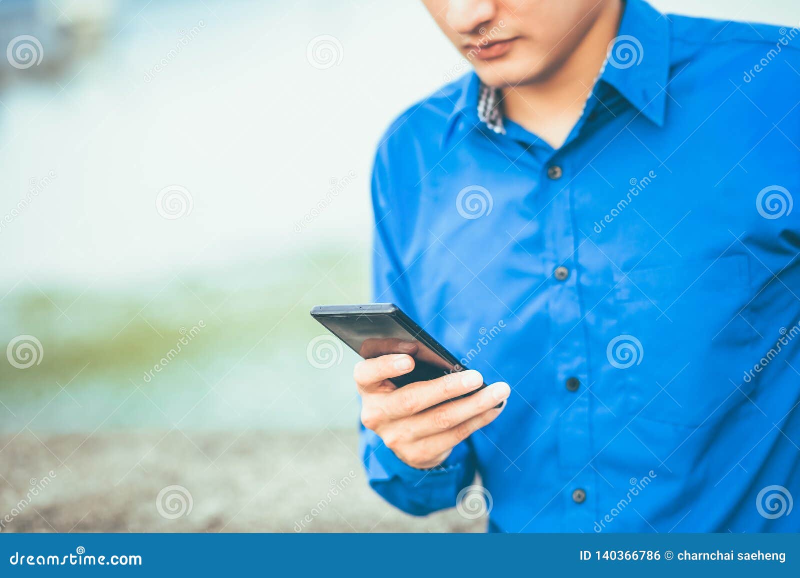 Businessman Hold Mobile Phone for Check Message, E-mail and Working ...