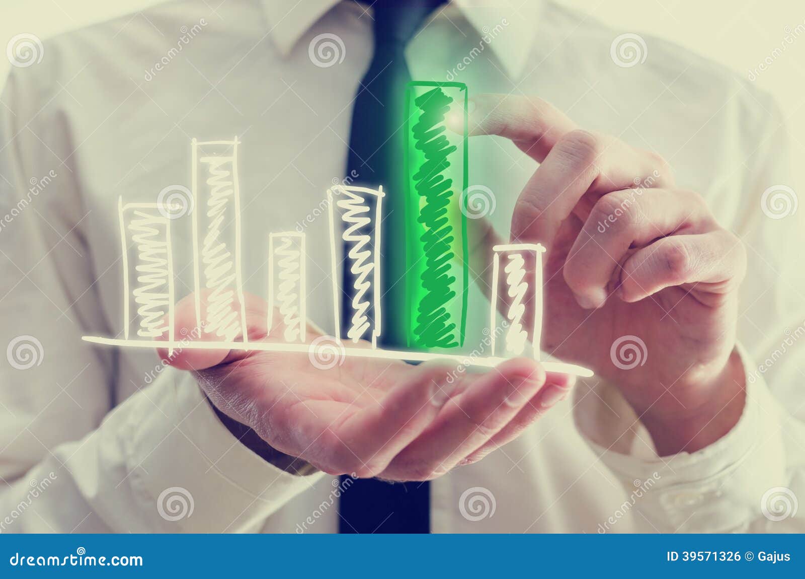 Businessman Holding a Bar Graph in His Hand Stock Photo - Image of ...