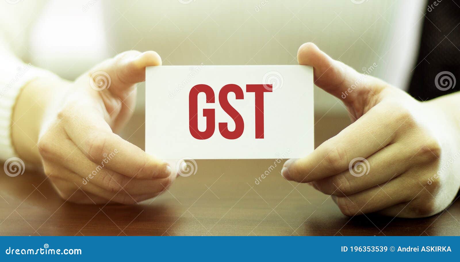 Businessman Holding a Card with Text GST Stock Image - Image of taxes ...